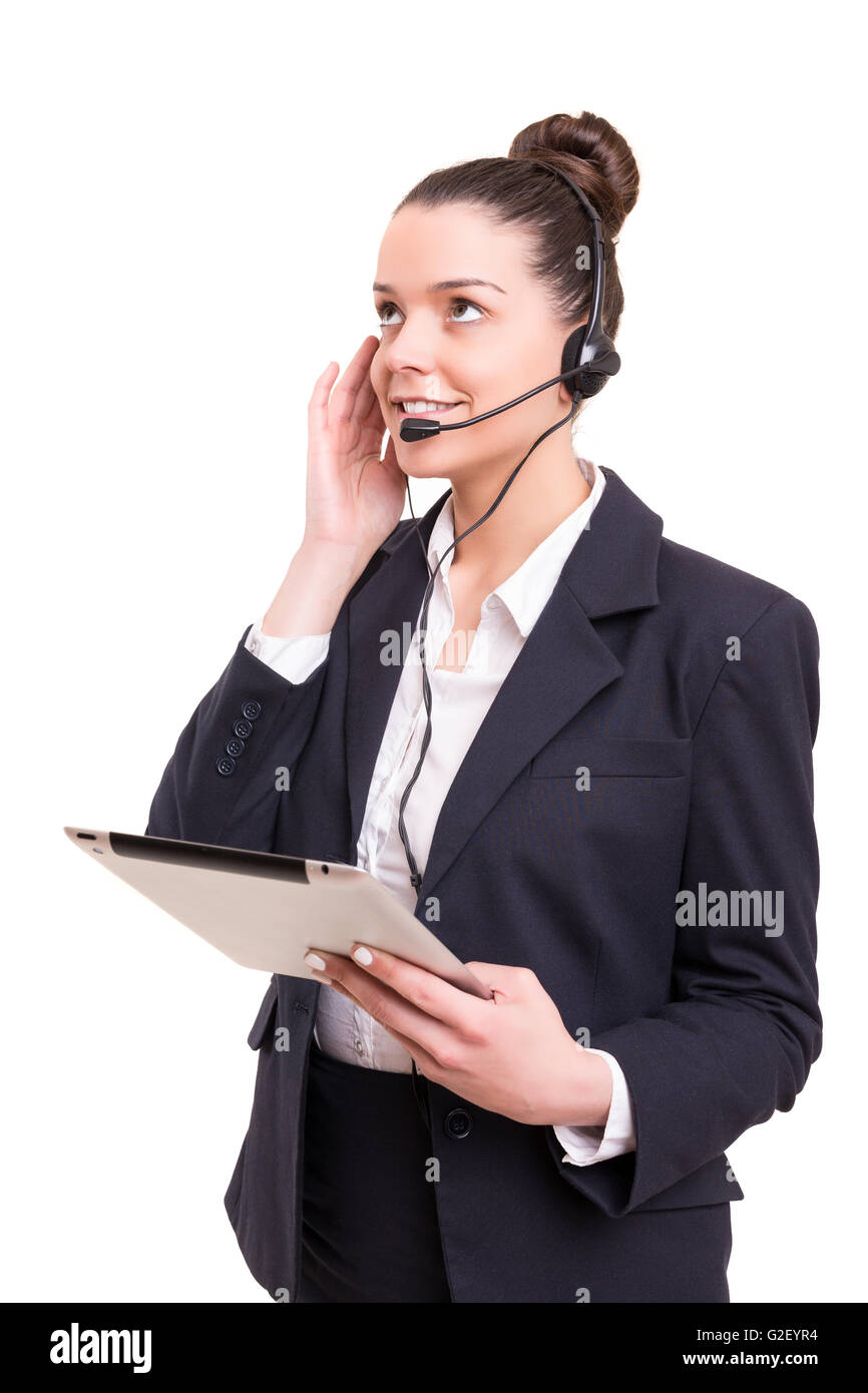 A friendly telephone operator smiling isolated over a white background ...
