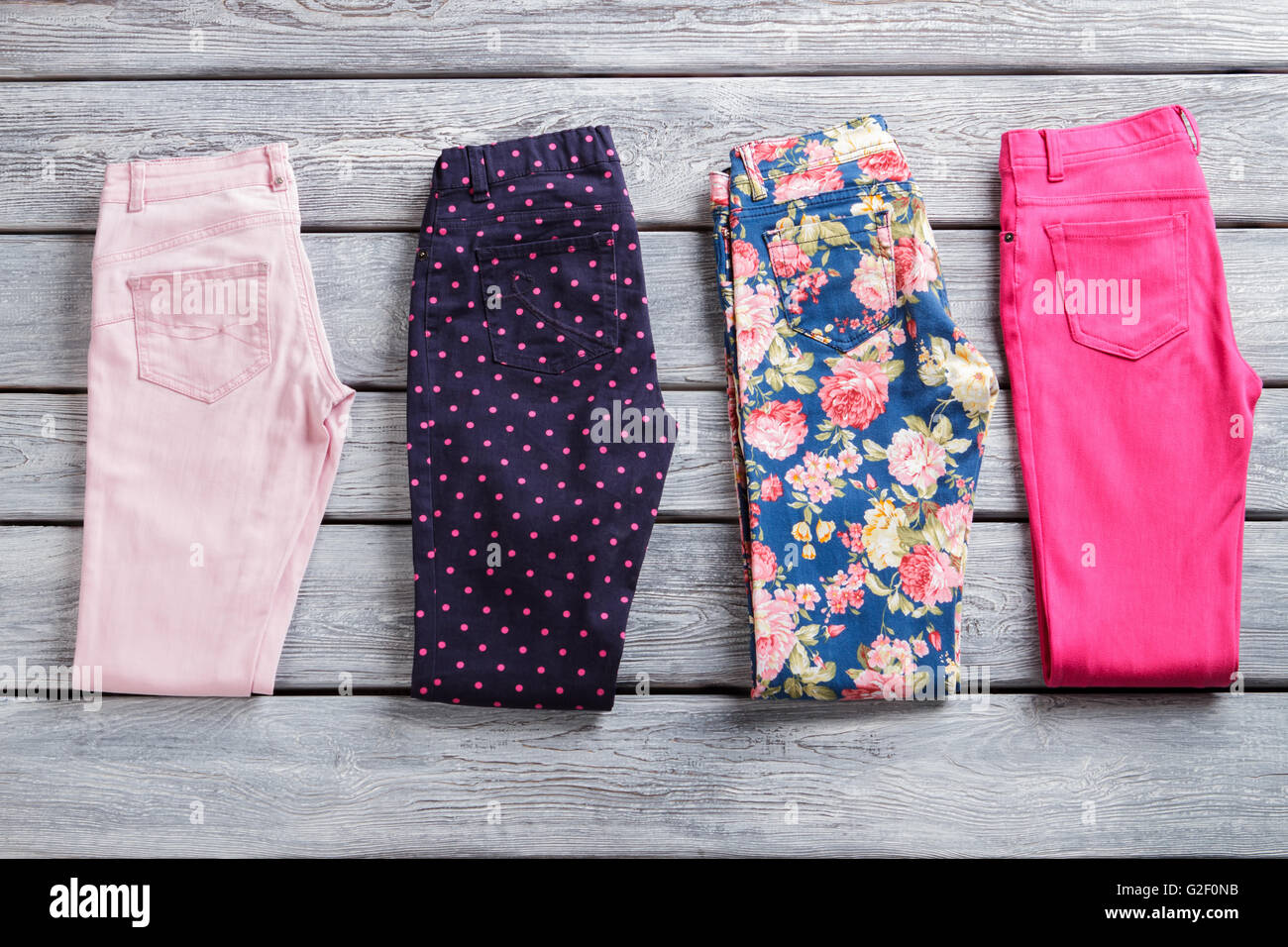 Folded colorful pants Stock Photo - Alamy