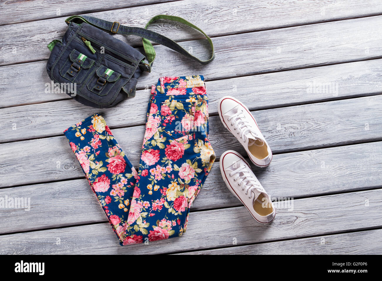 Floral pattern pants and bag Stock Photo - Alamy