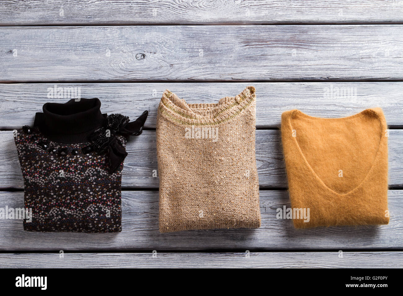 Sweaters of different color Stock Photo - Alamy