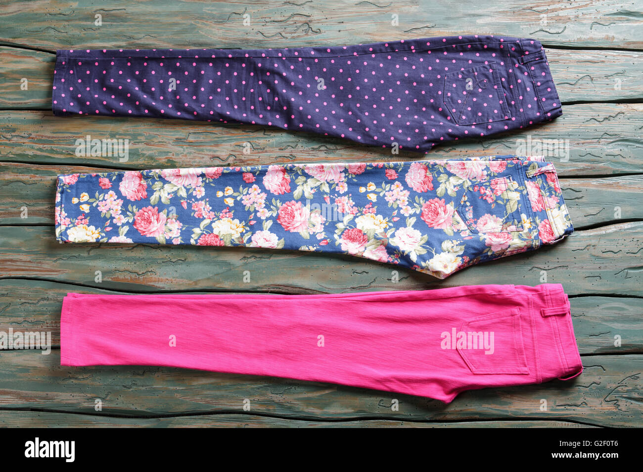 Different color female pants Stock Photo - Alamy