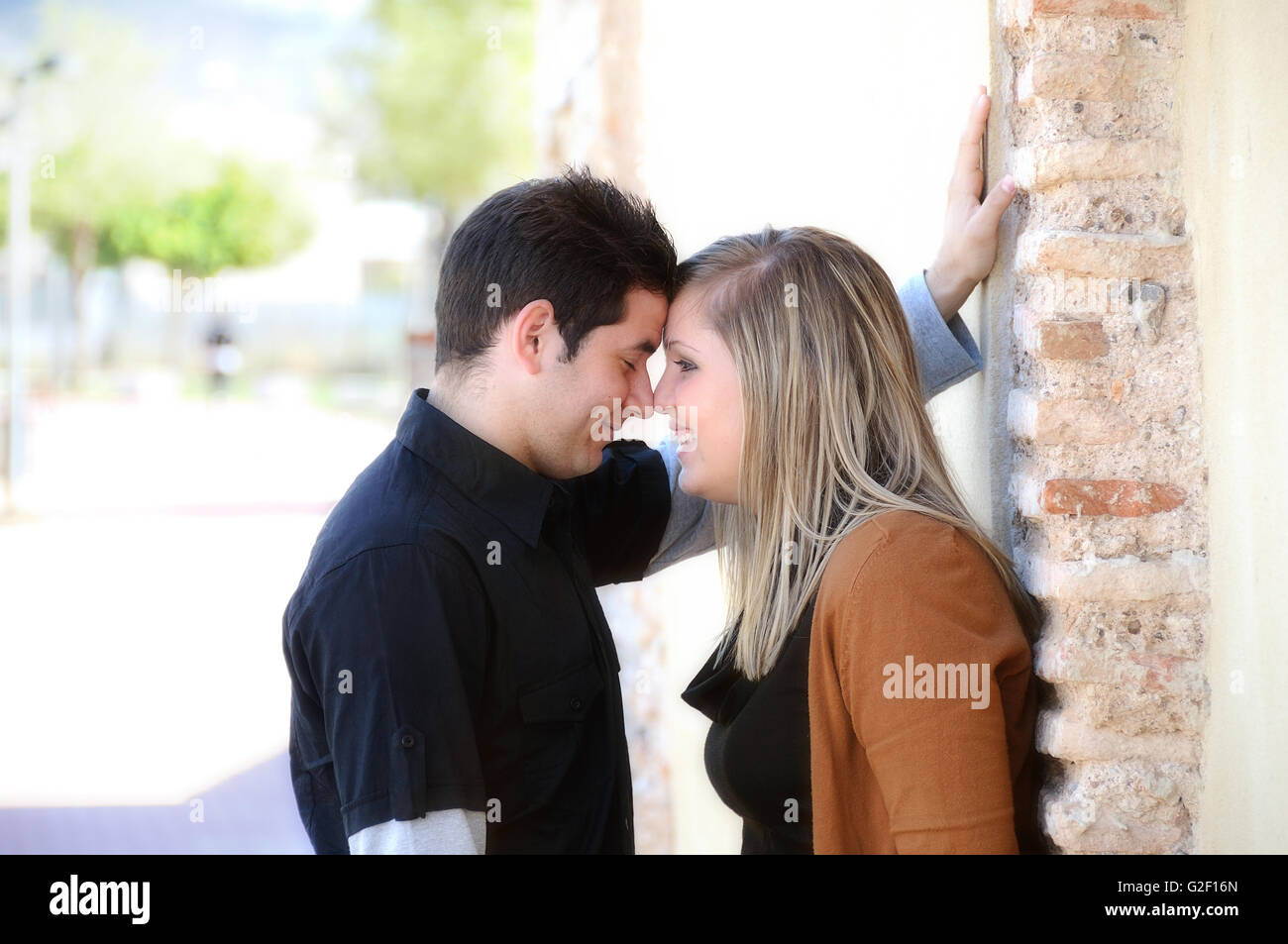 Romantic couple flirting outdoors hi-res stock photography and images ...