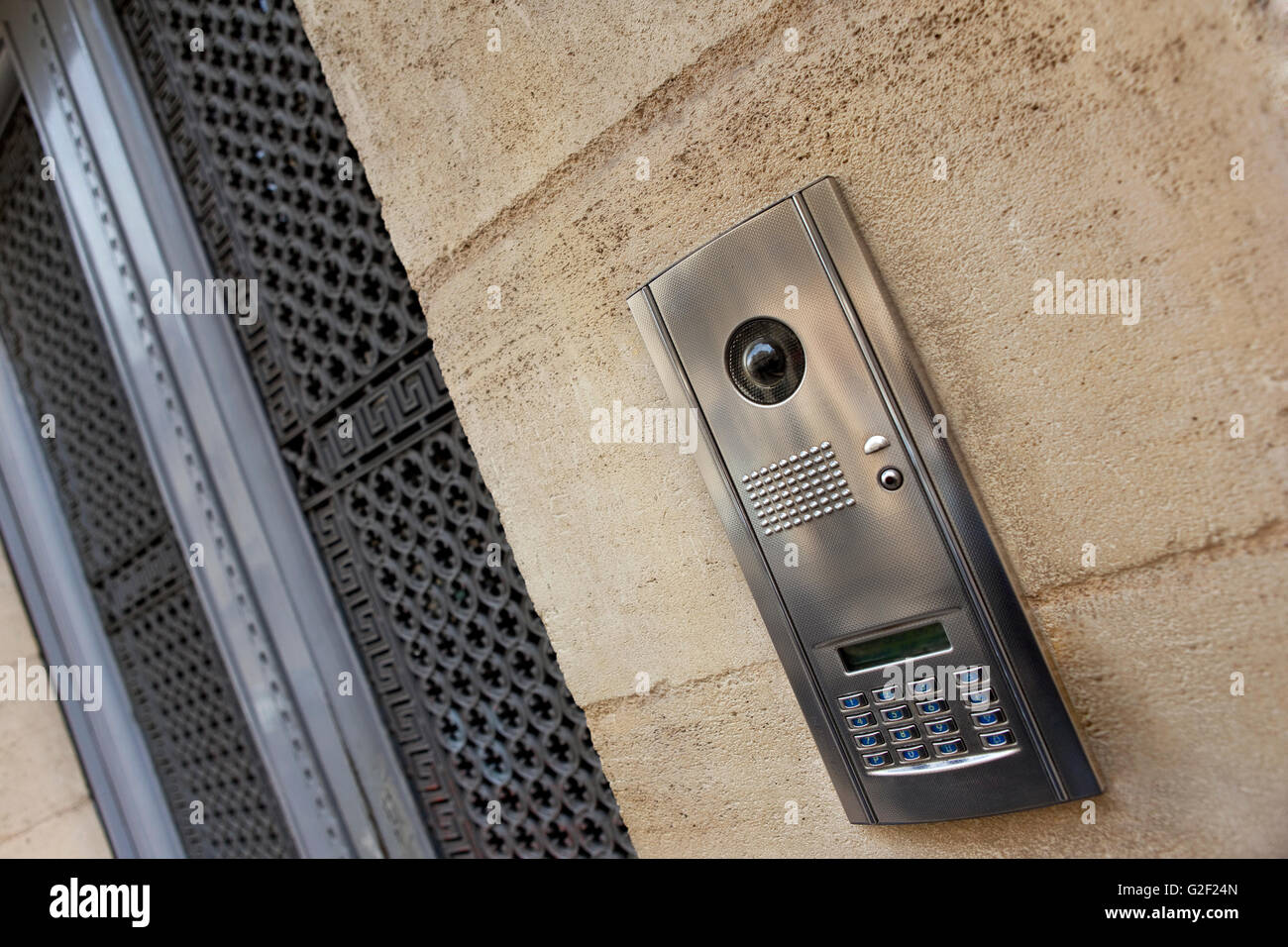 Close up of a modern intercom on a stone facade of a French house Stock ...