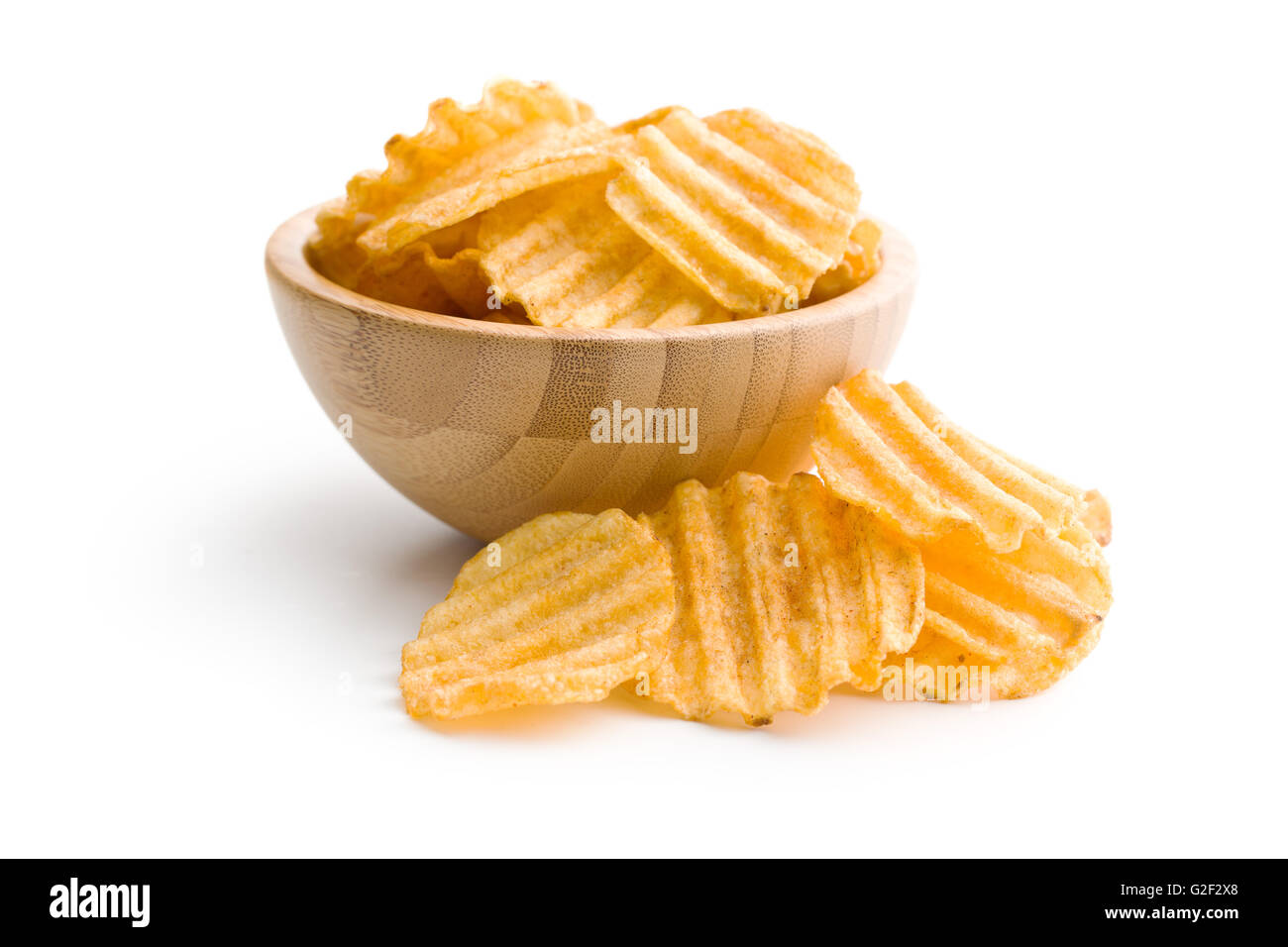 Crinkle cut potato chips isolated on white background. Tasty spicy ...