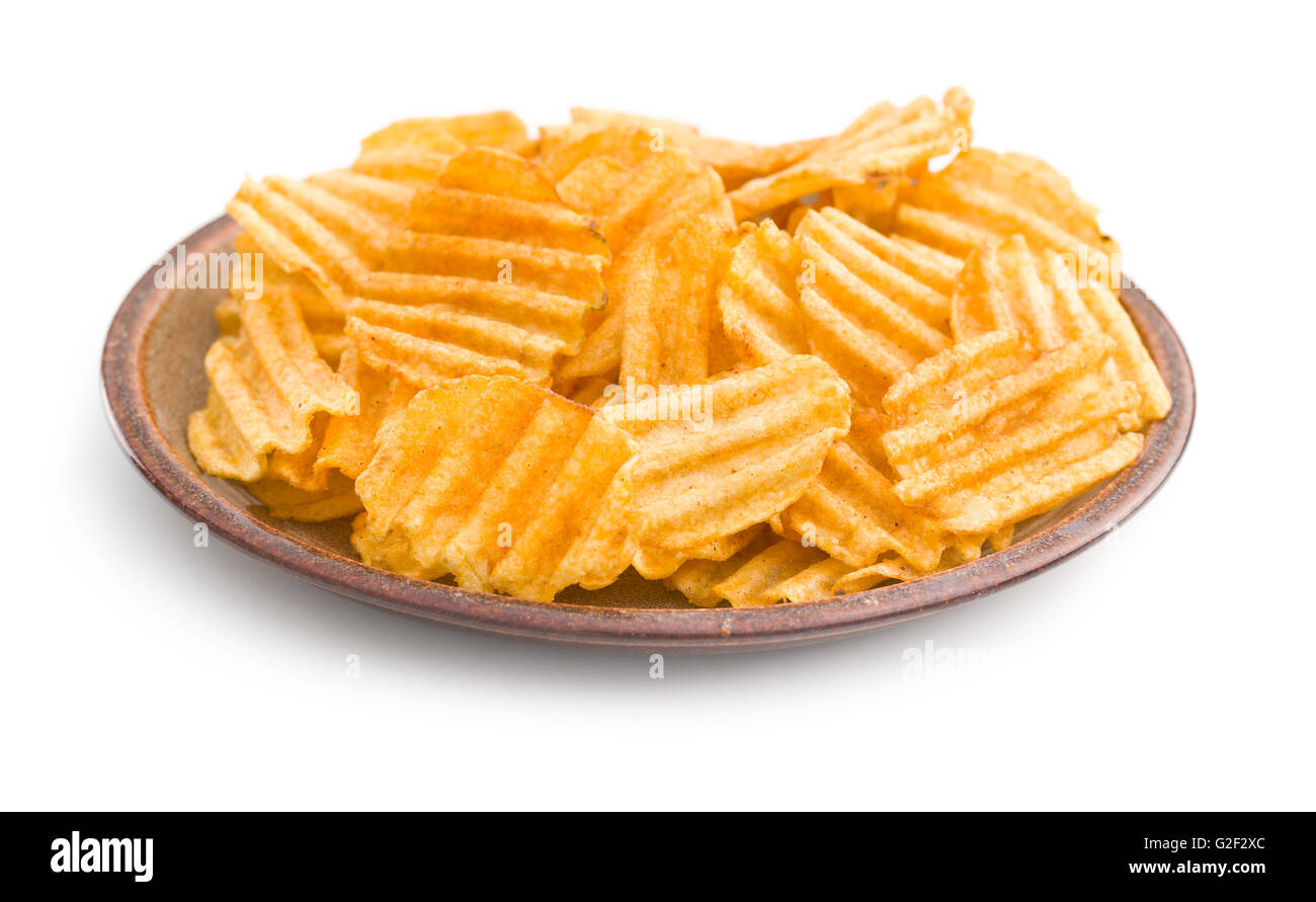 Crinkle cut potato chips isolated on white background. Tasty spicy ...