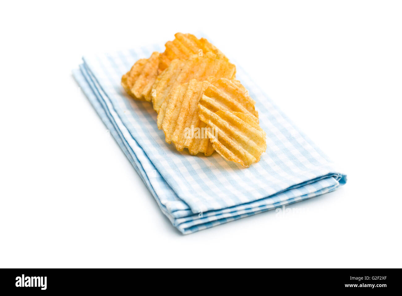 Crinkle cut potato chips isolated on white background. Tasty spicy ...