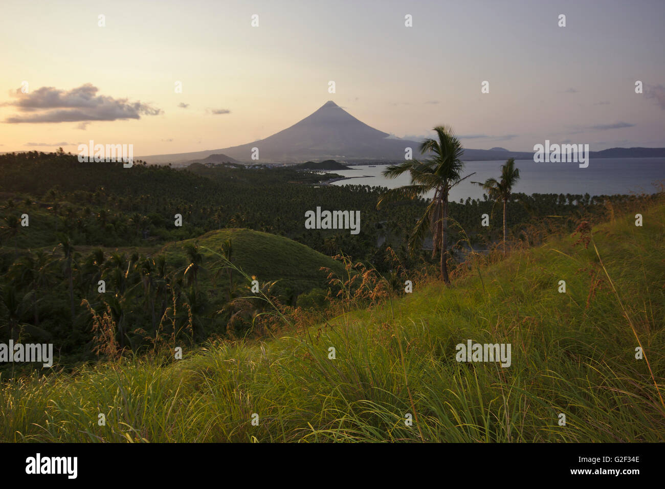 View over Golf of Albay and Legazpi to Mount Mayon in evening light ...