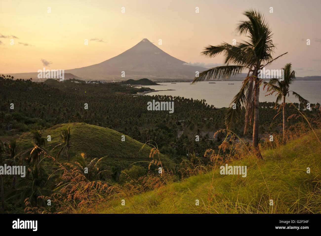 View over Golf of Albay and Legazpi to Mount Mayon in evening light ...