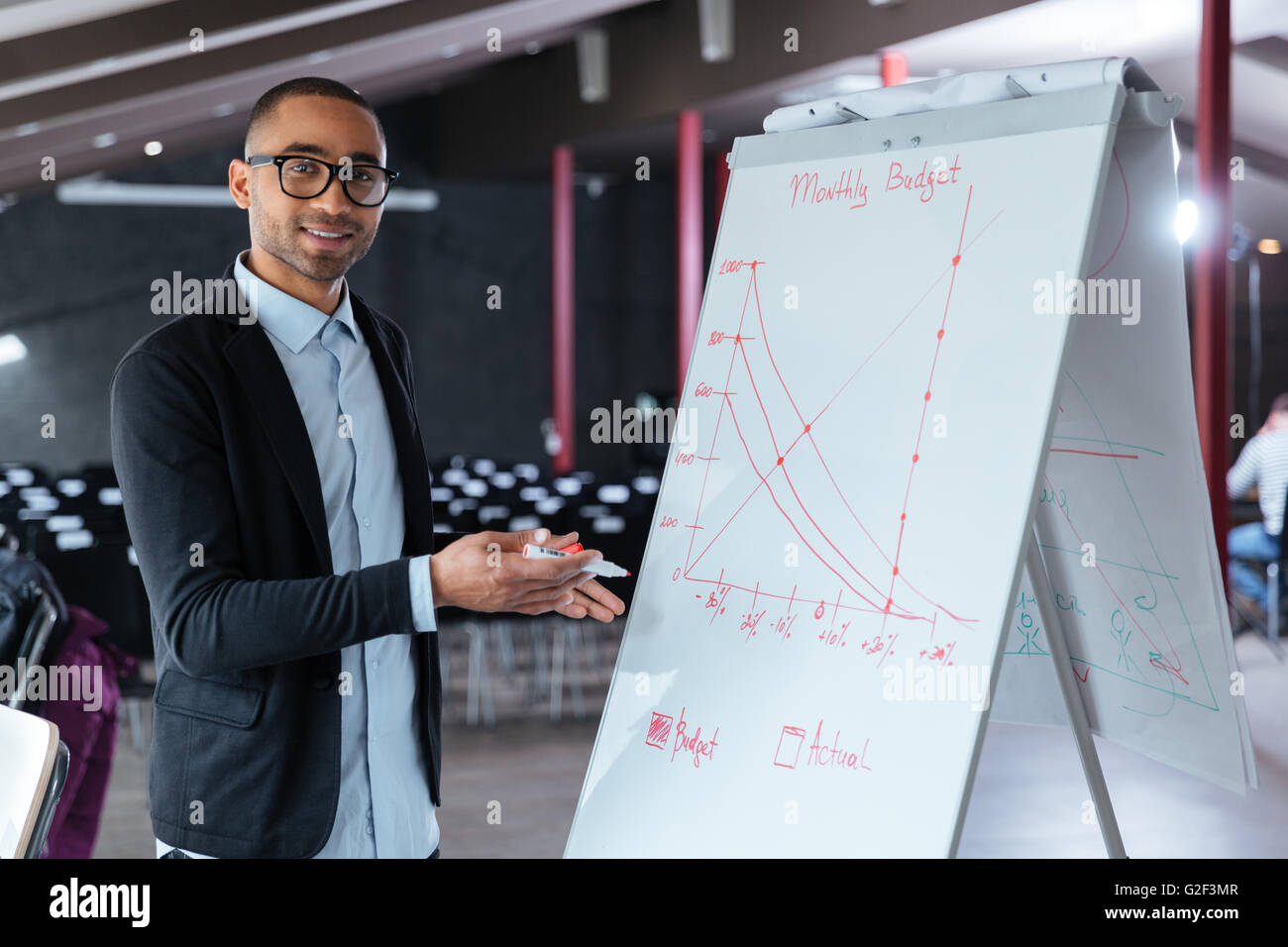 Presentation man suit flip chart hi-res stock photography and images ...