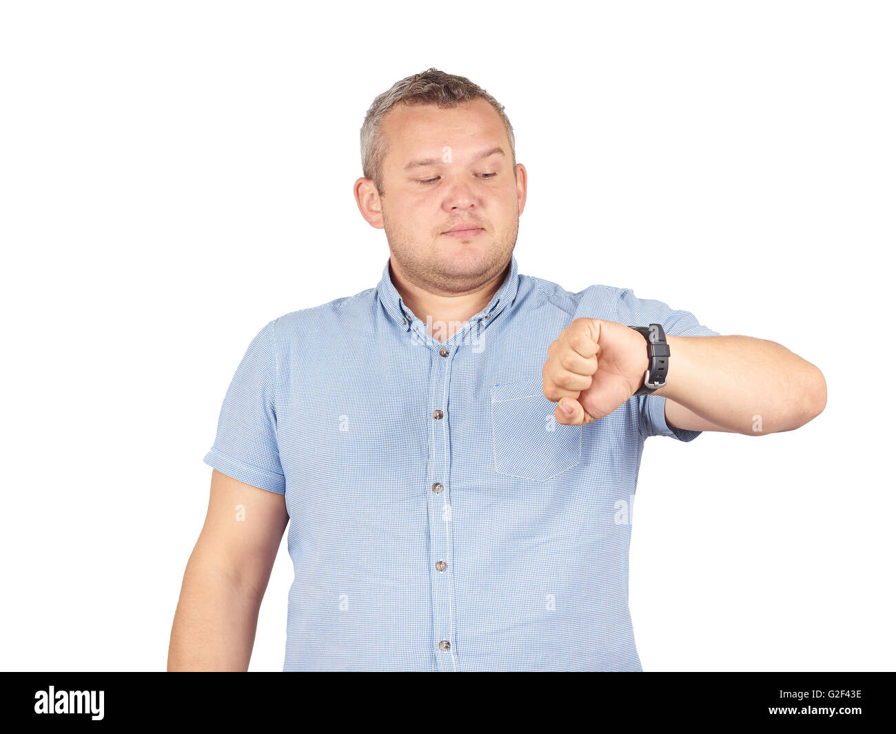 Fat businessman late for work, looking at his watch on Isolated on ...