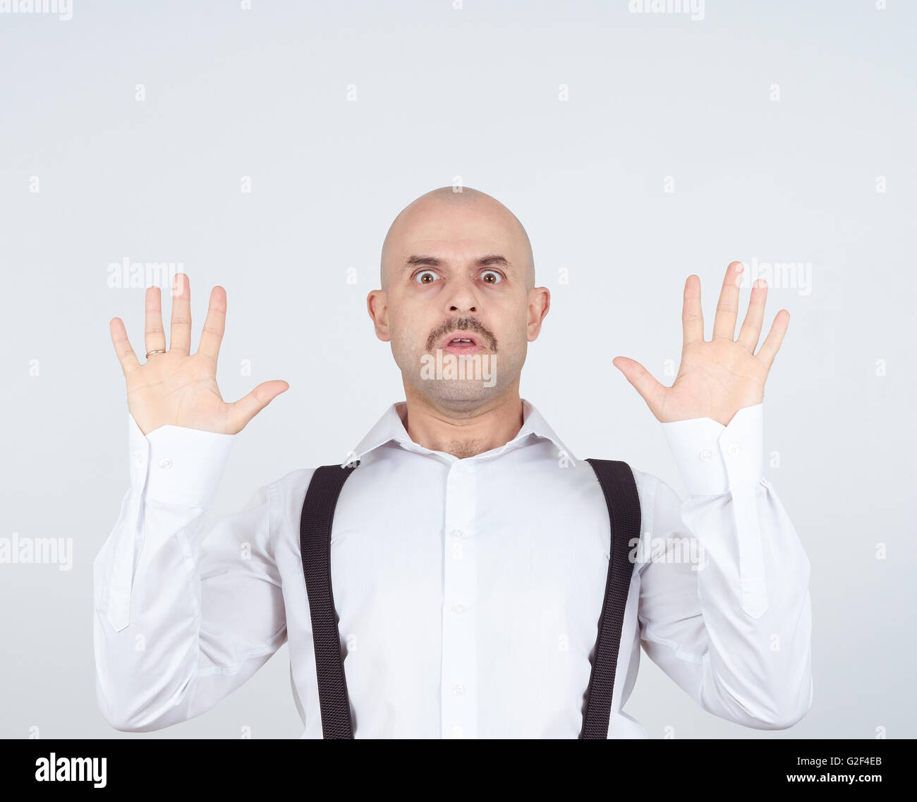 bald man feels awkward, anxiously isolated. fear phobia Stock Photo - Alamy