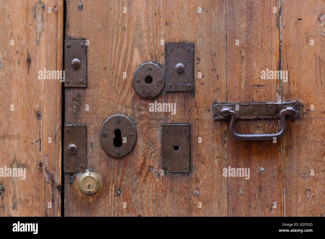 Old wooden door, iron lock Stock Photo - Alamy