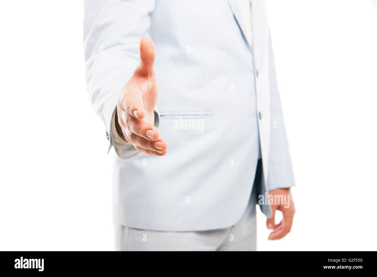 Close up of businessman wearing light suit extended his hand to ...