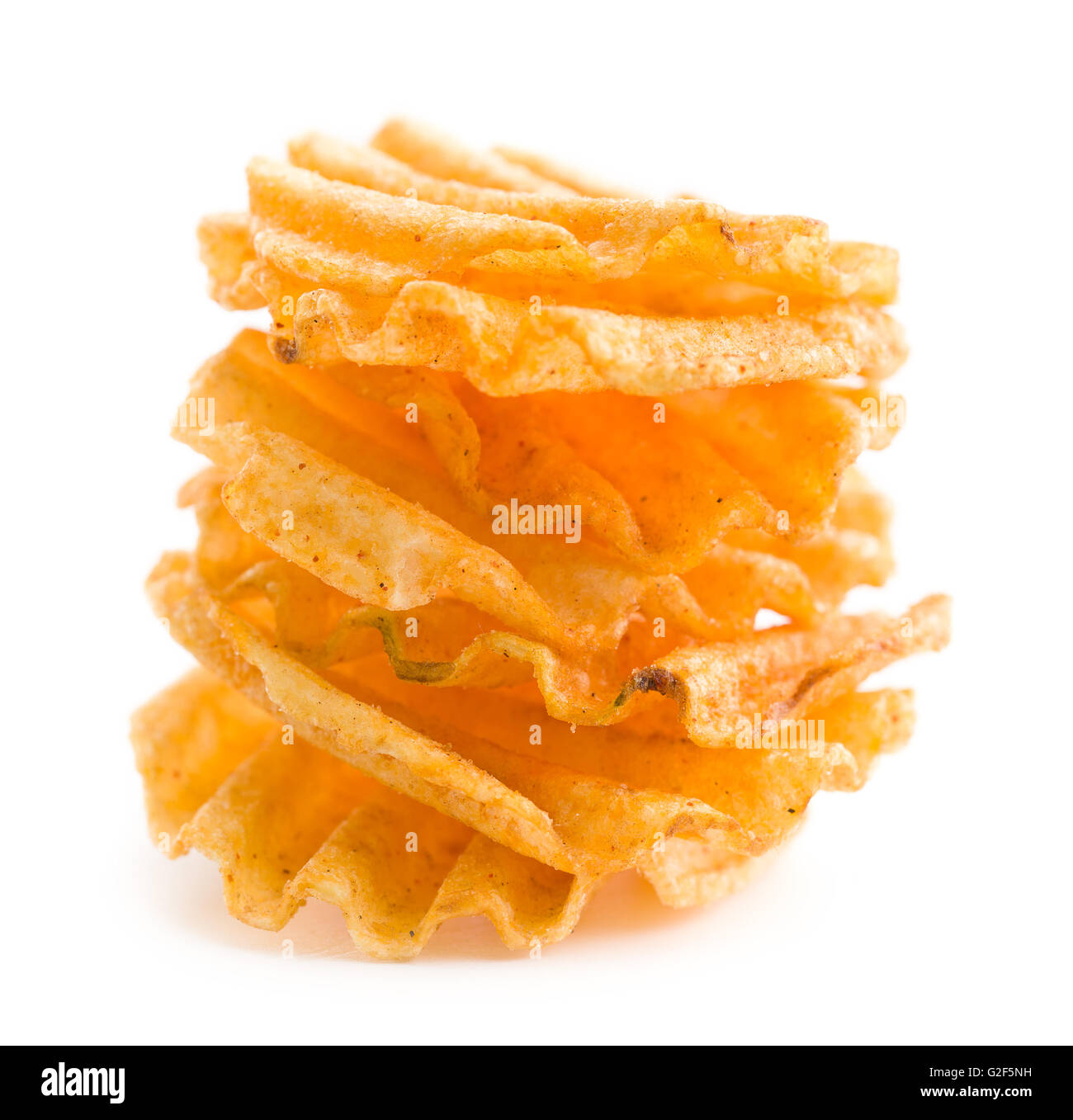 Crinkle cut potato chips isolated on white background. Pile of tasty ...