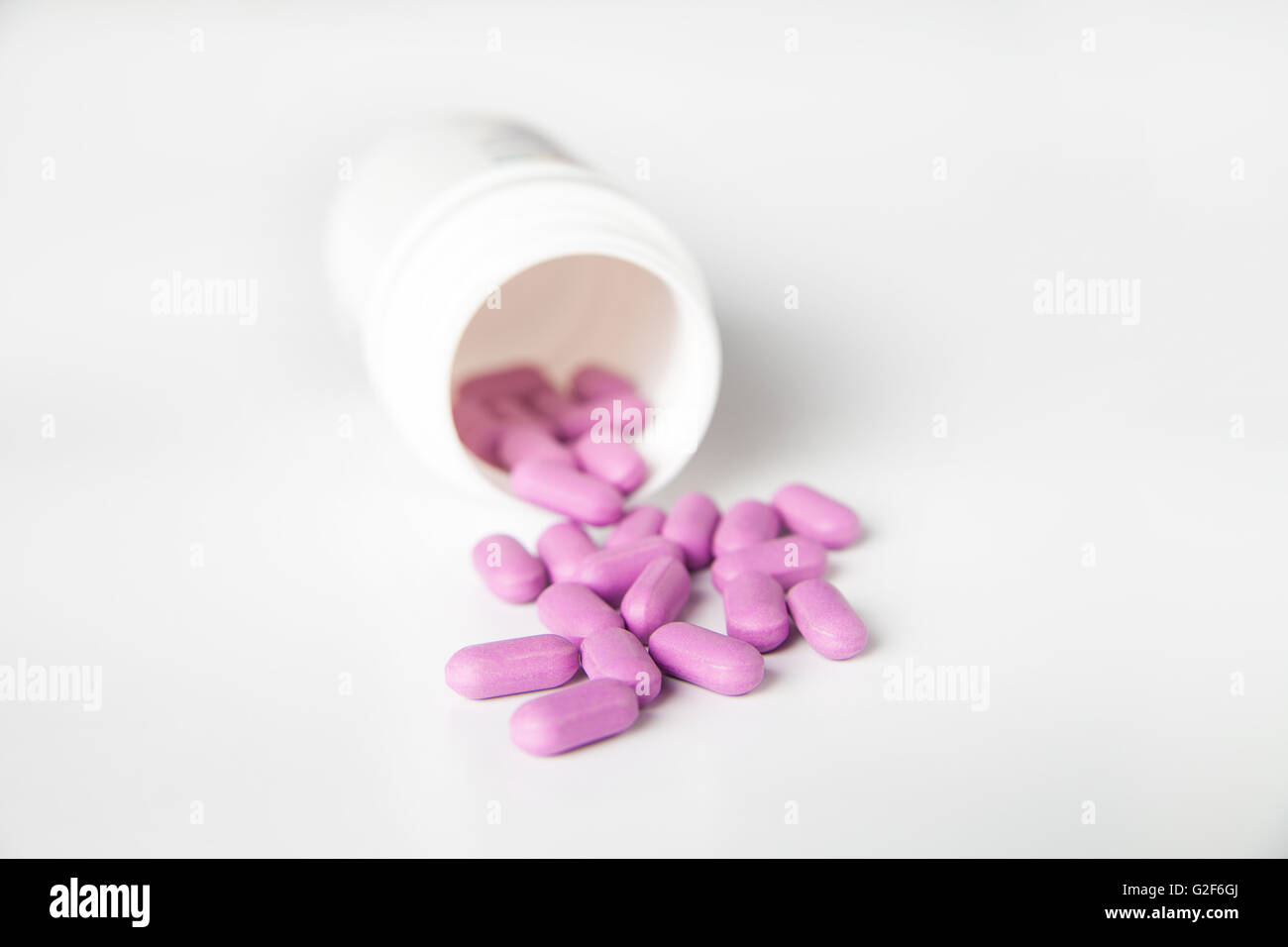 Pink pill bottle hi-res stock photography and images - Alamy