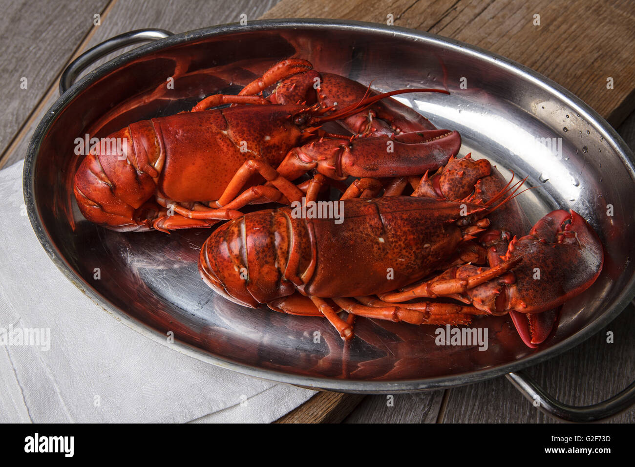 Freshly cooked lobsters served whole for dinner Stock Photo - Alamy