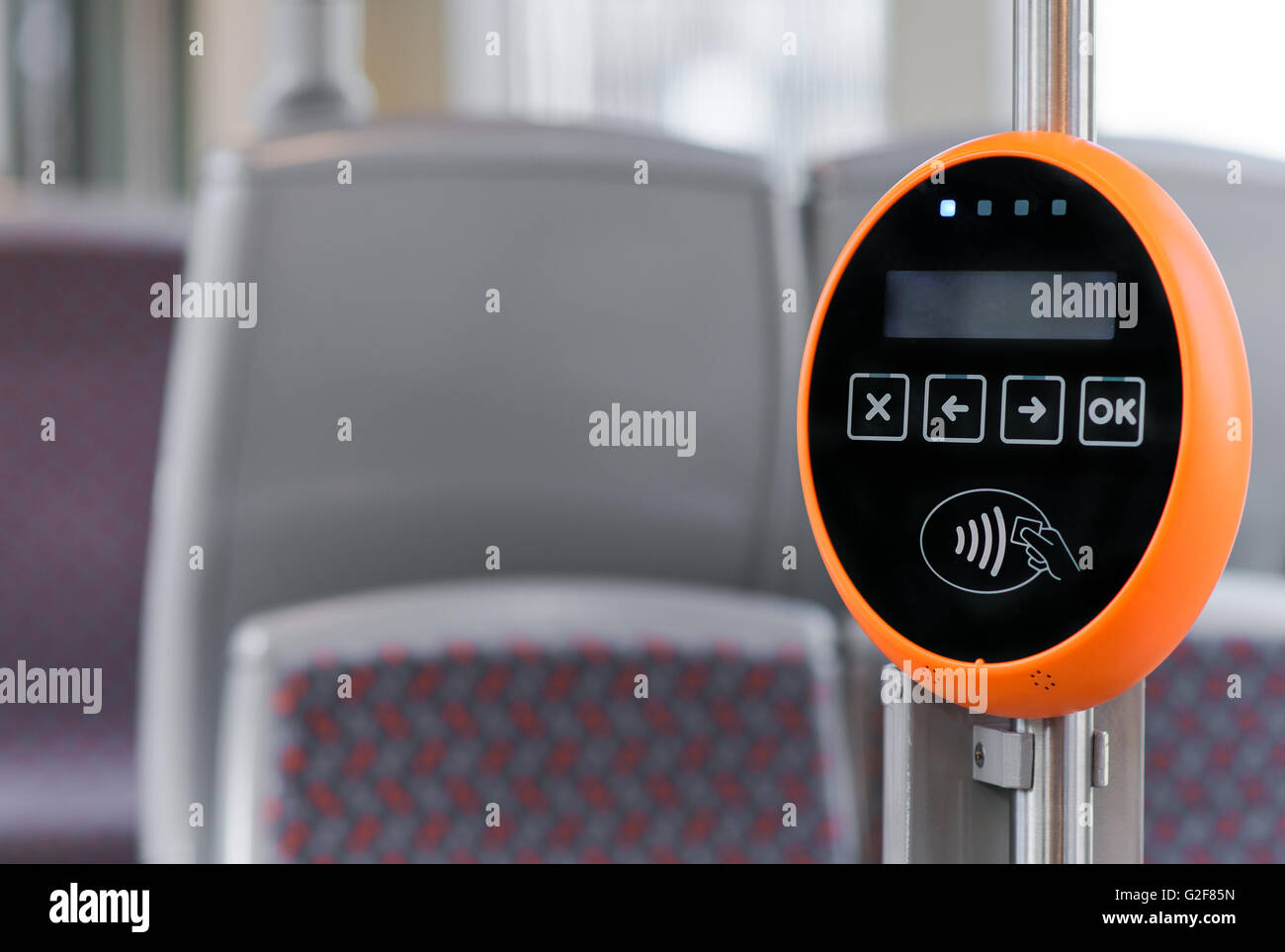 Ticket validation system on modern public transport Stock Photo - Alamy