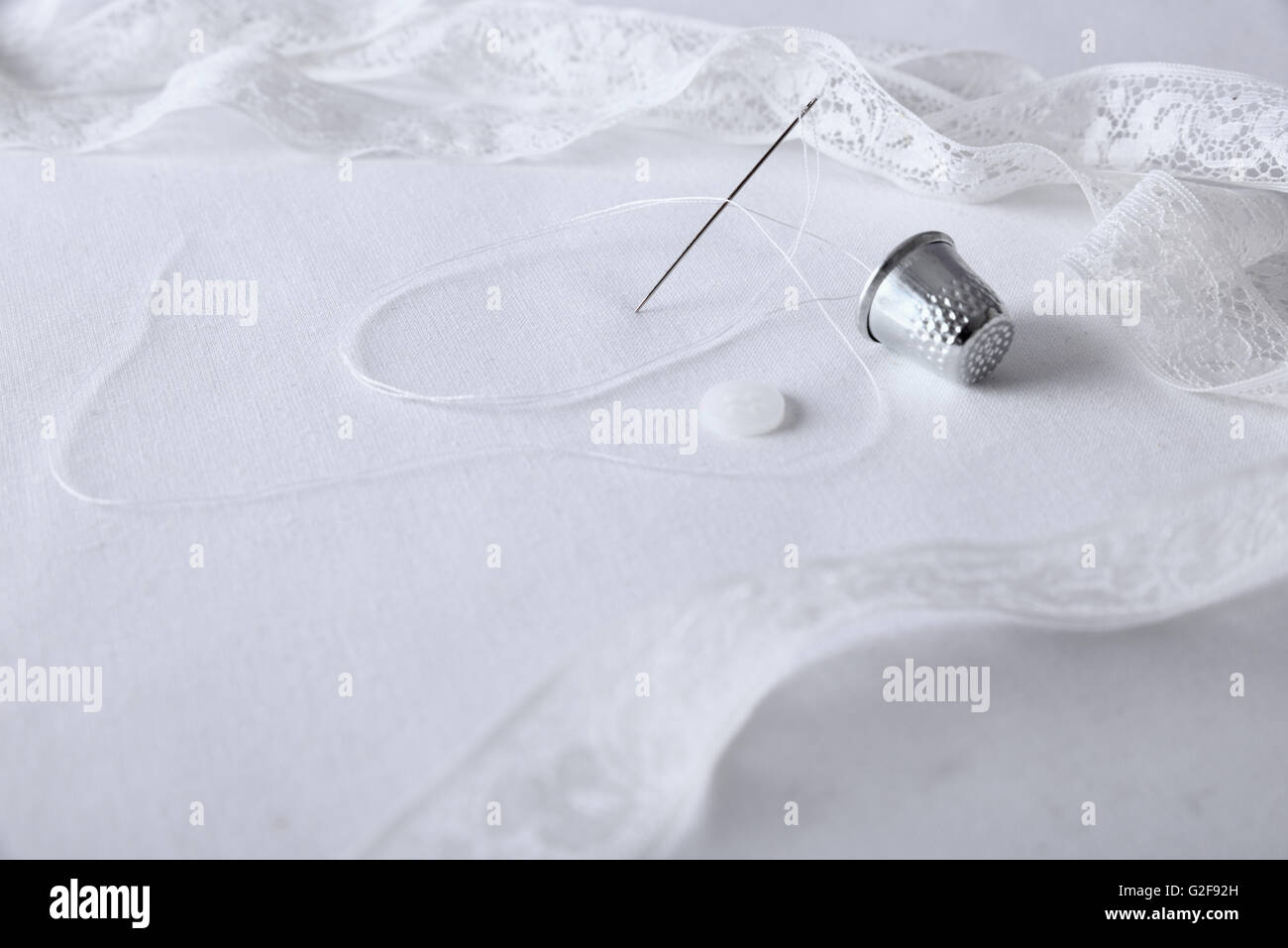 Threading needle hi-res stock photography and images - Alamy