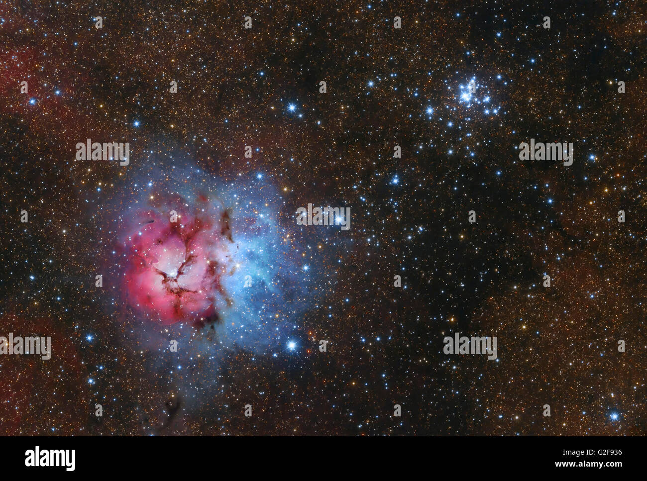 The Trifid Nebula and Messier 21 cluster in Sagittarius Stock Photo - Alamy