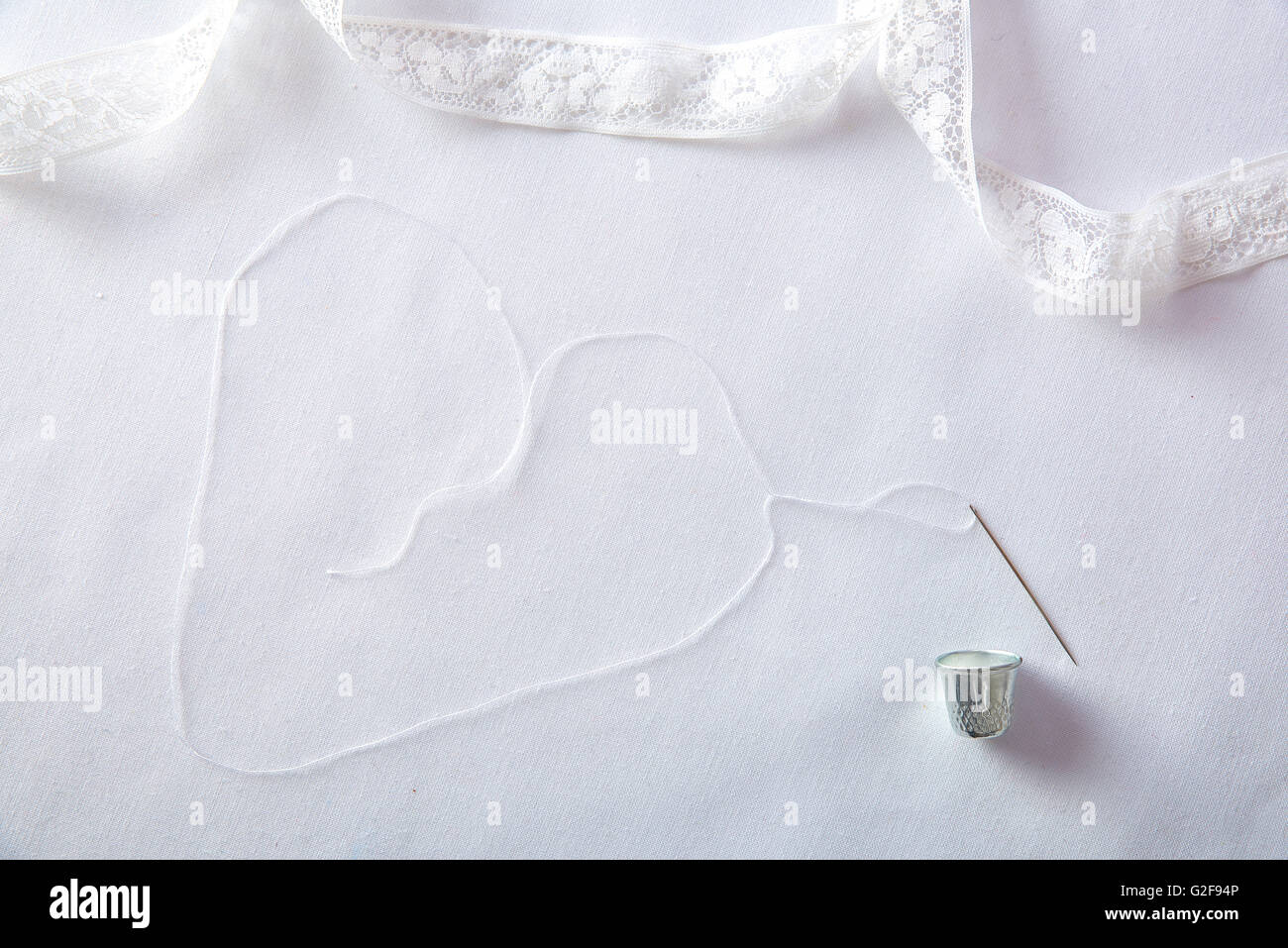 Threading needle hi-res stock photography and images - Alamy