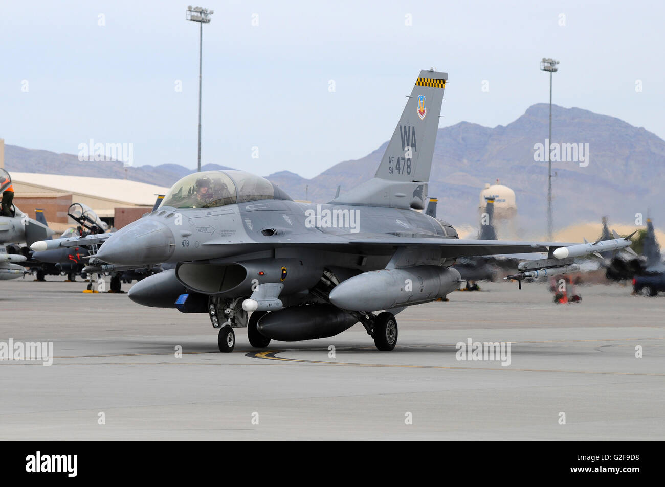 A U.S. Air Force F-16C from 16th Weapons Squadron, 57th Wing, taxiing ...