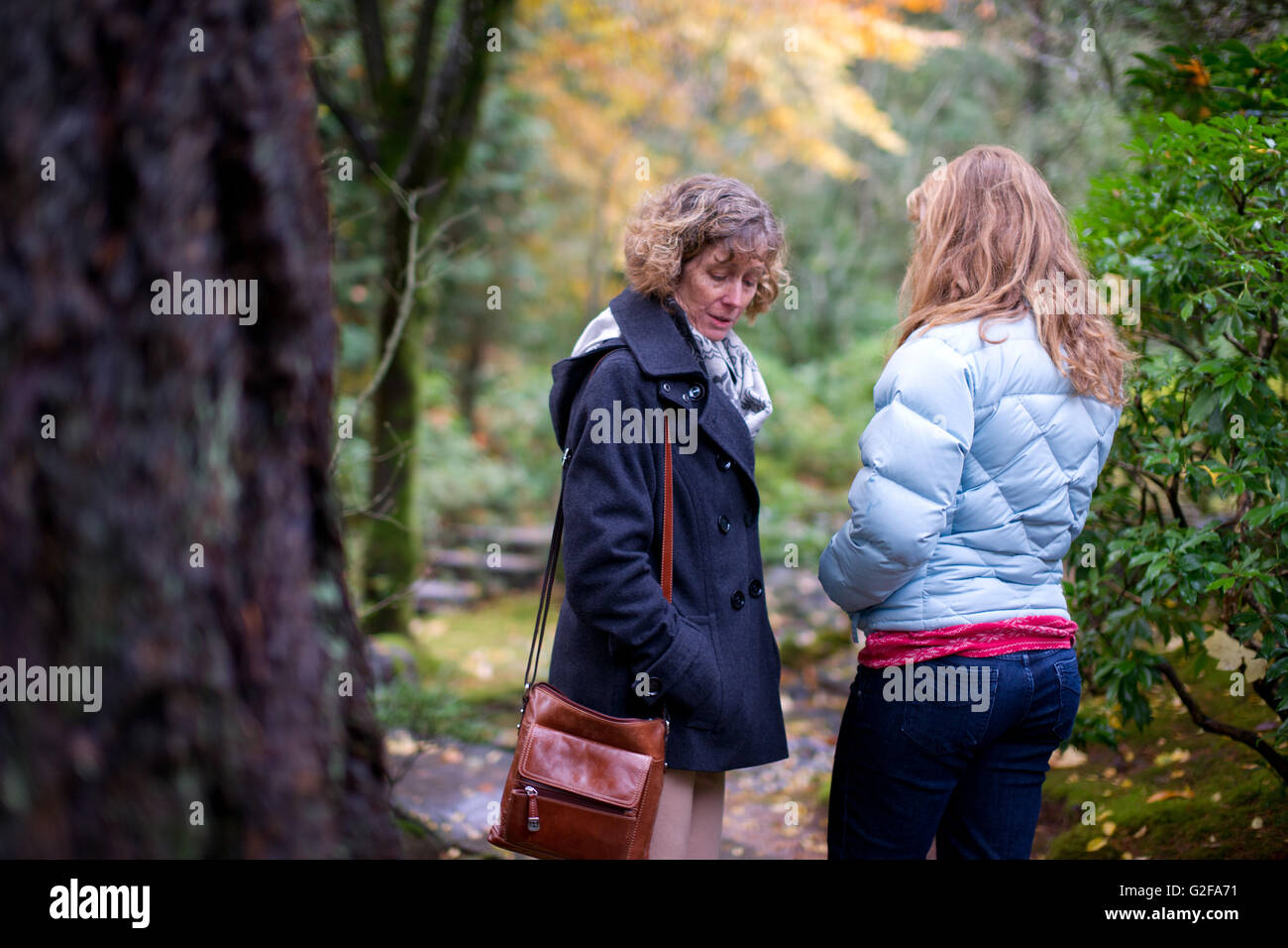 Mother and Daughter Talking Outdoor Stock Photo - Alamy