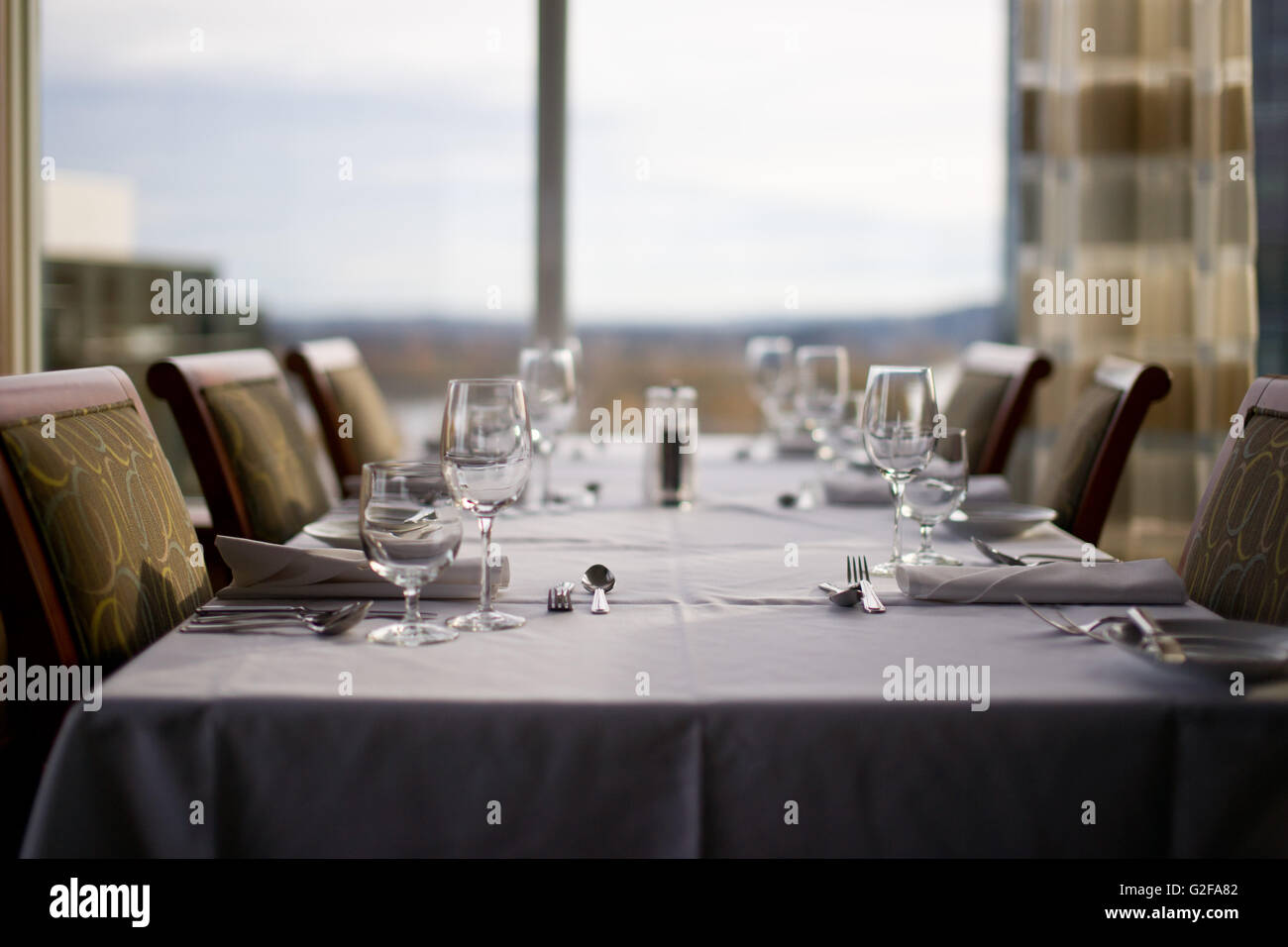Restaurant Table Setting in Front of Window Stock Photo - Alamy