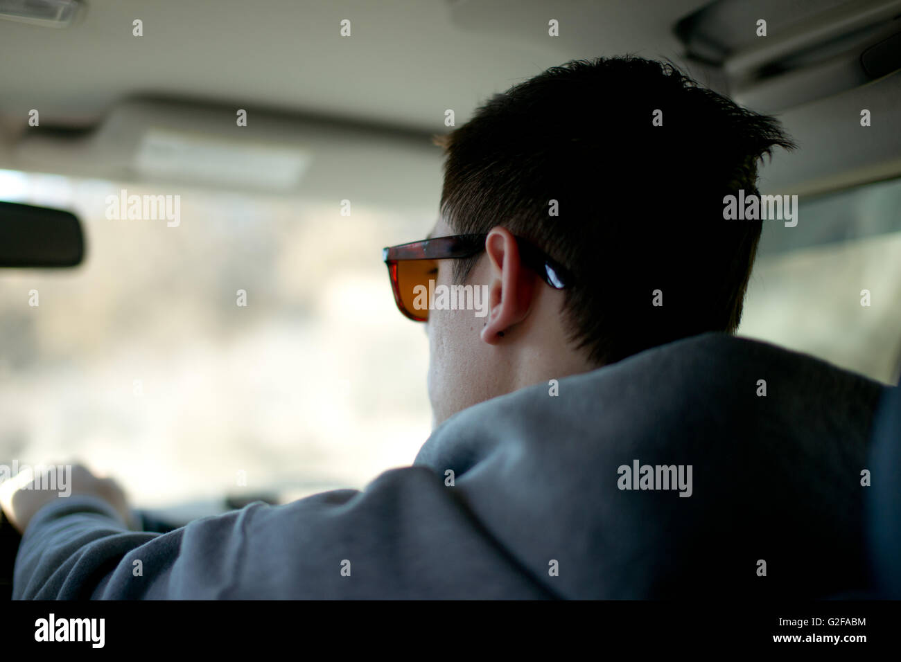 Male Passenger in Car, Rear View Stock Photo - Alamy