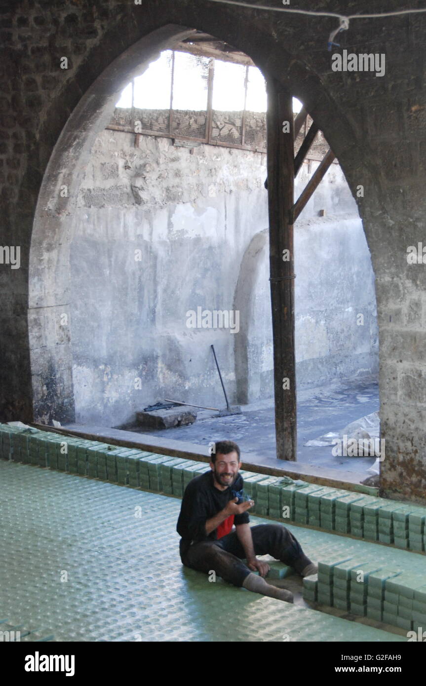 Aleppo - Worker At Soap Factory Stock Photo - Alamy