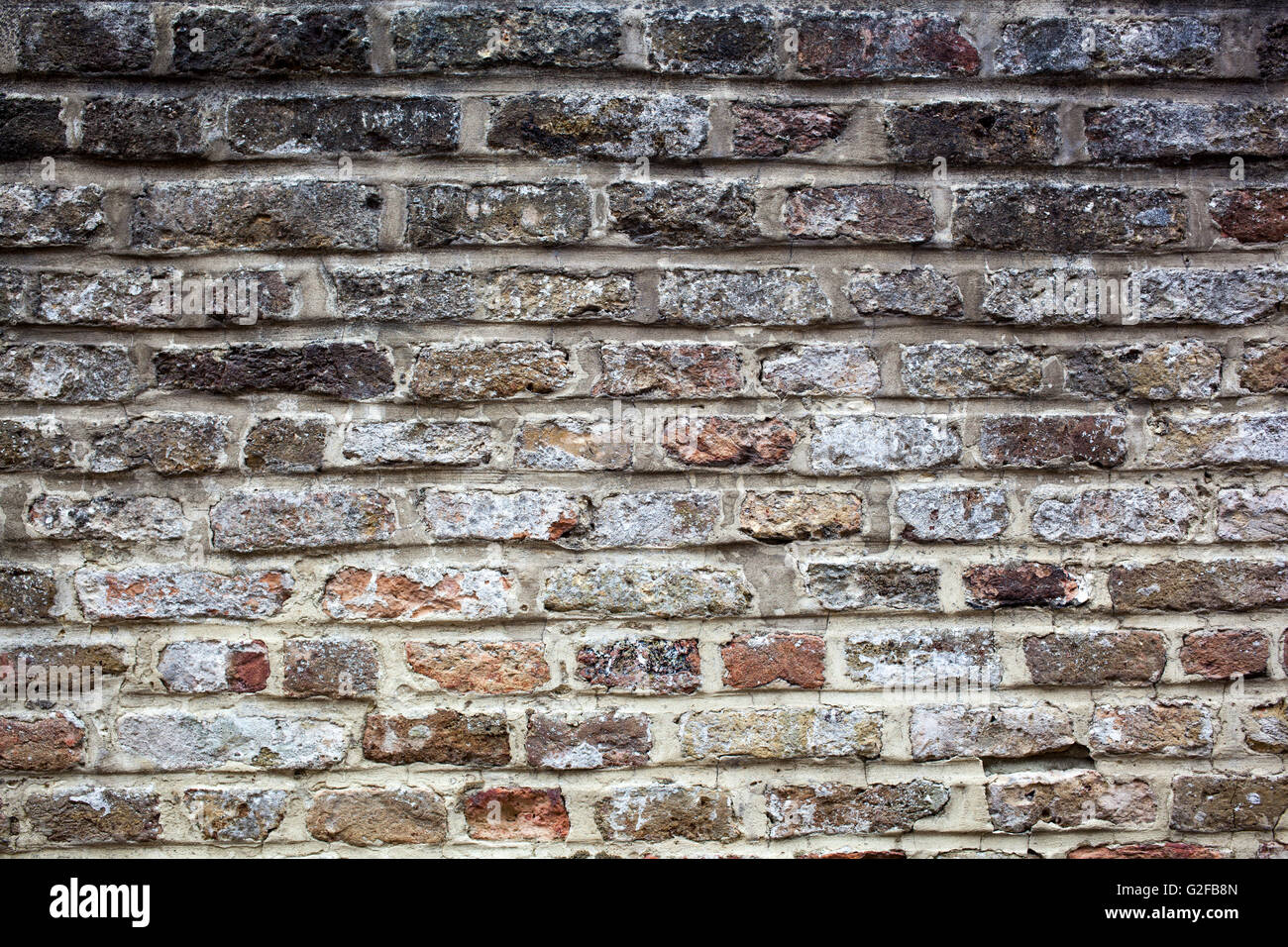 Old grey grunge brick wall background Stock Photo - Alamy