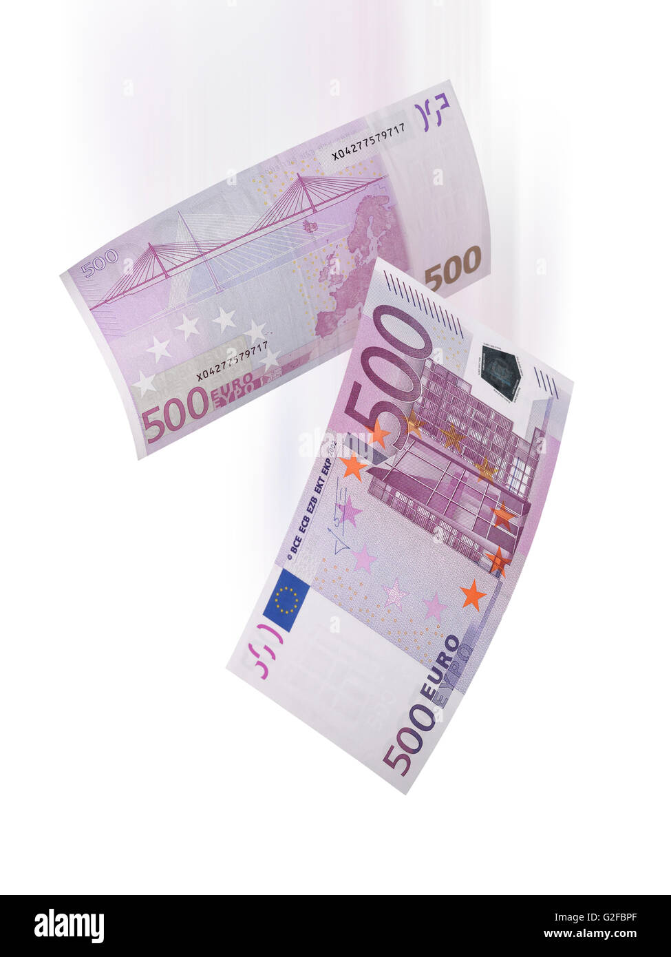 Five hundred euro bills falling isolated on white. Vertical format ...