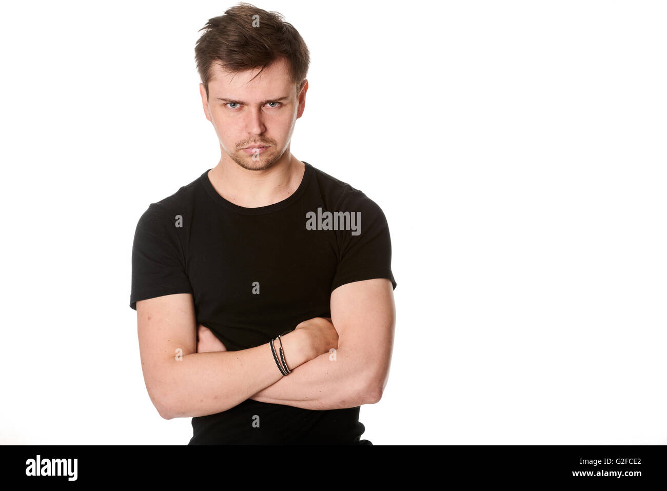 Portrait of serious young man, questioning expression,horizontal on ...