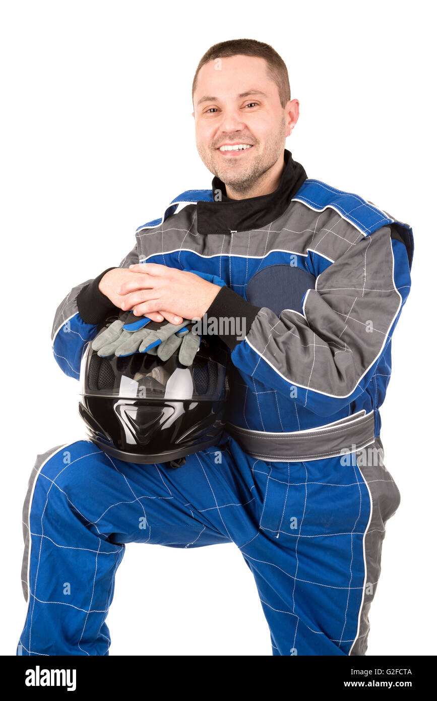 Racing driver posing with helmet isolated in white Stock Photo - Alamy