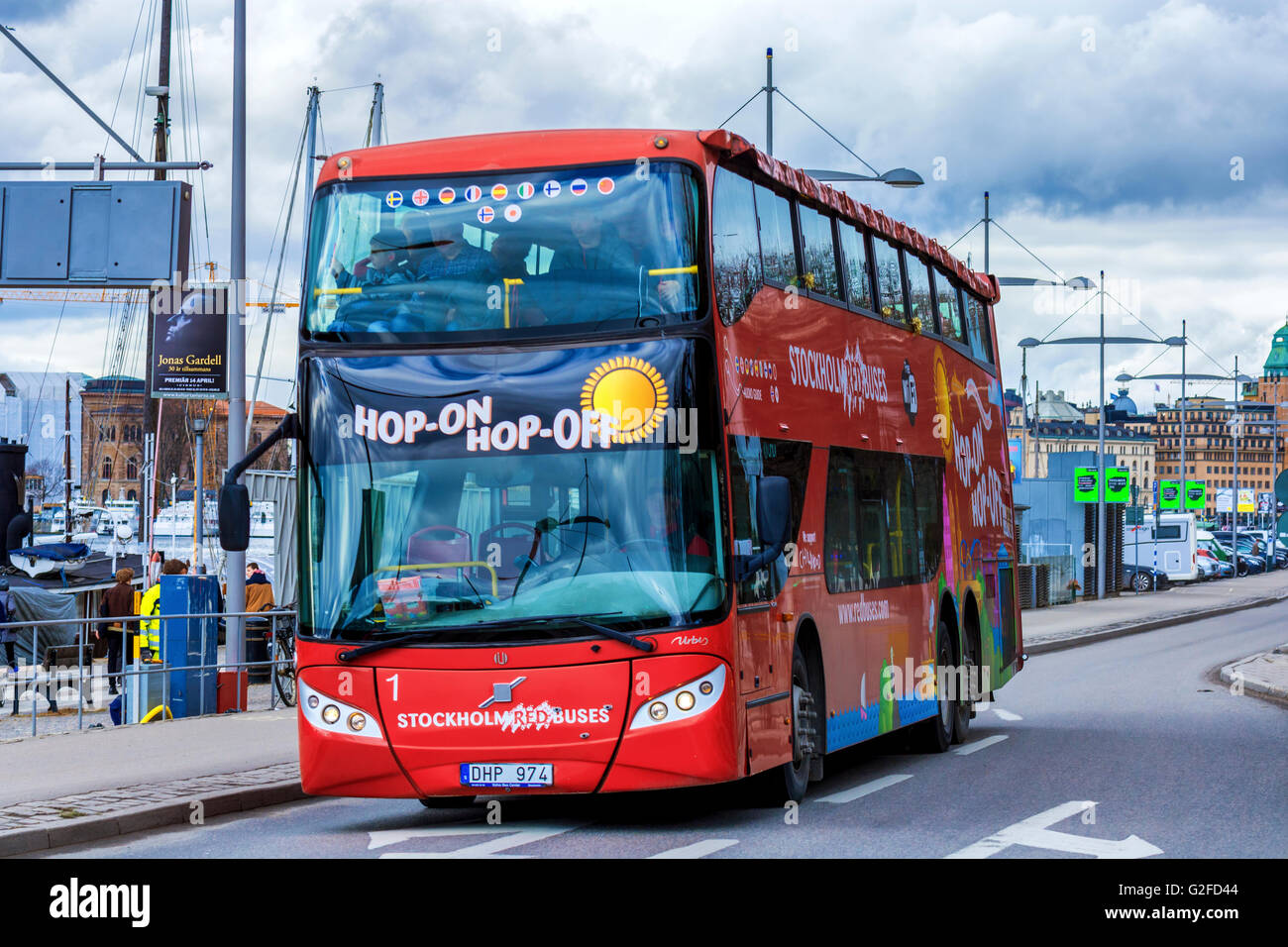 STOCKHOLM, SWEDEN - MARCH 30, 2016: Red bus transport tourists in the ...