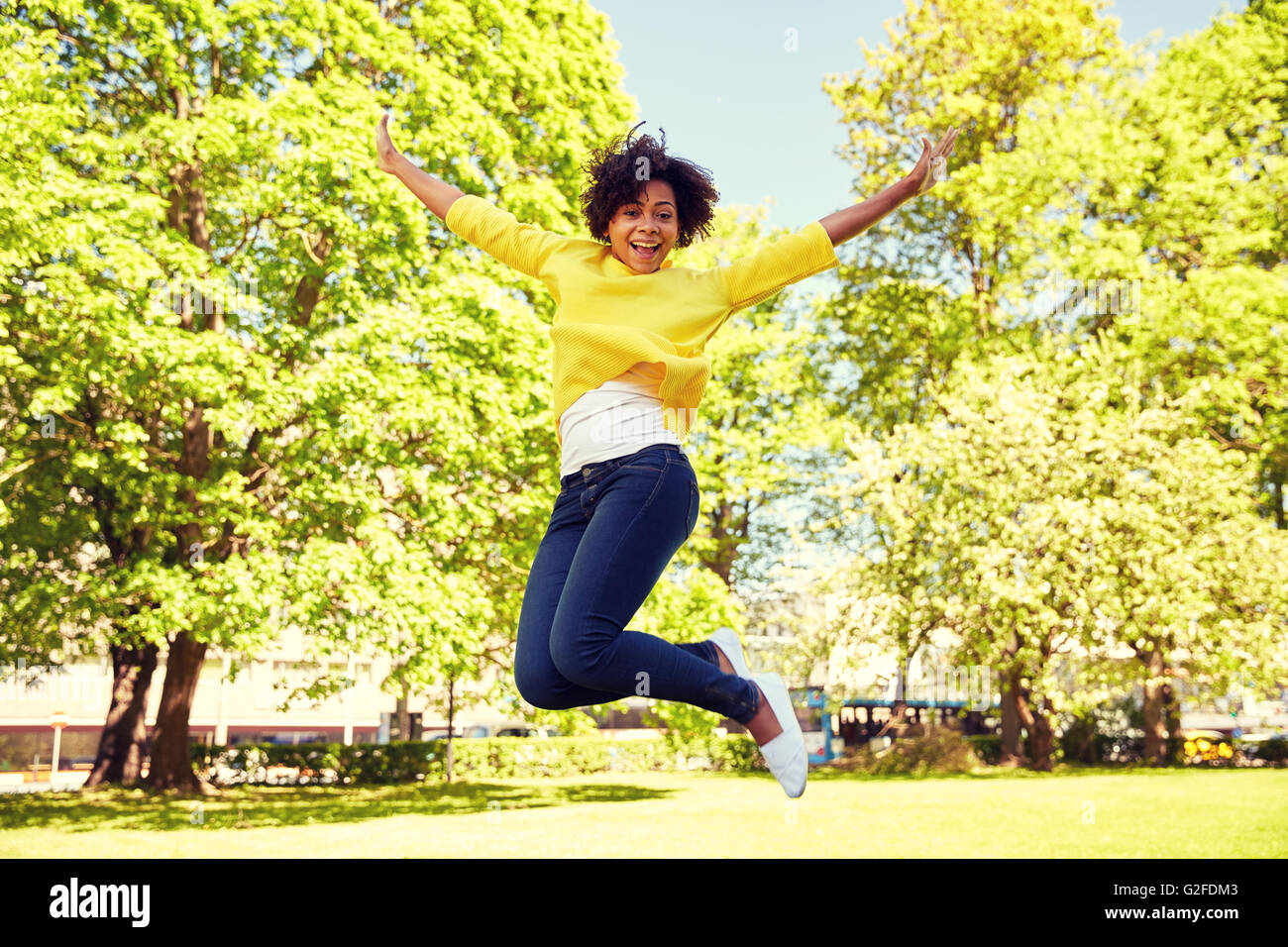 Black Woman Jumping For Joy