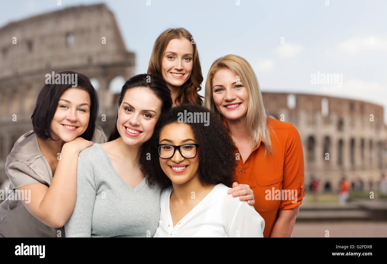 group of happy different women over coliseum Stock Photo - Alamy