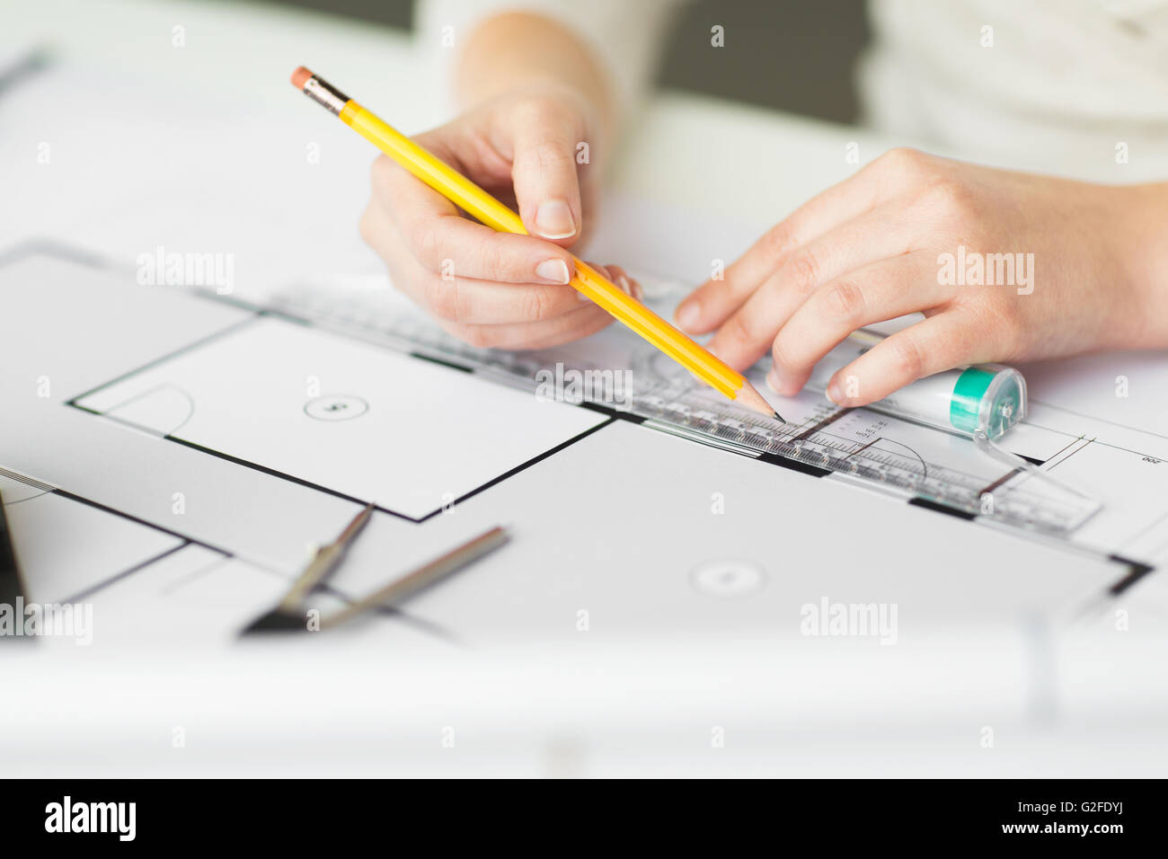 close up of hands with compass measuring blueprint Stock Photo - Alamy