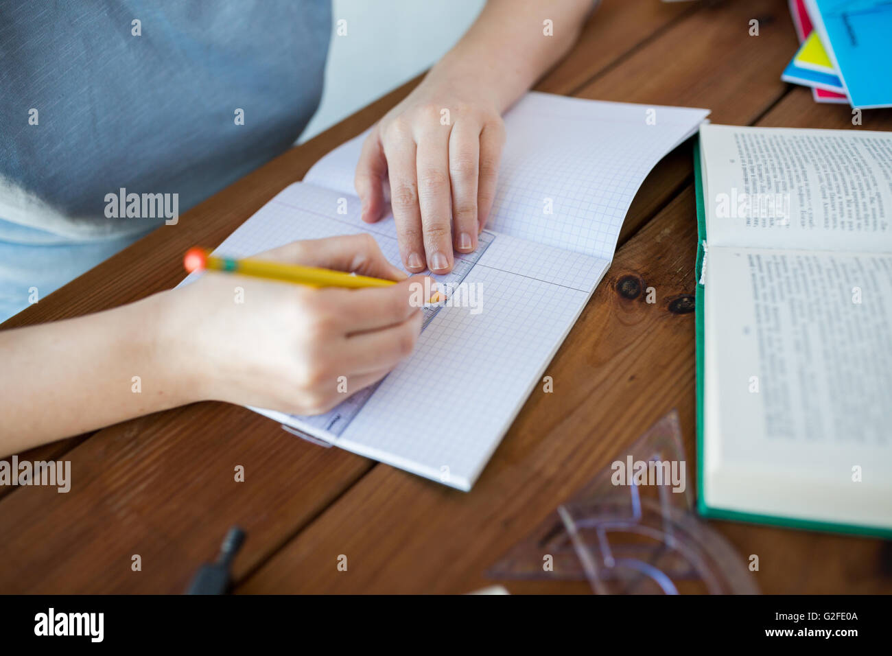 close up of hands with ruler and pencil drawing Stock Photo - Alamy