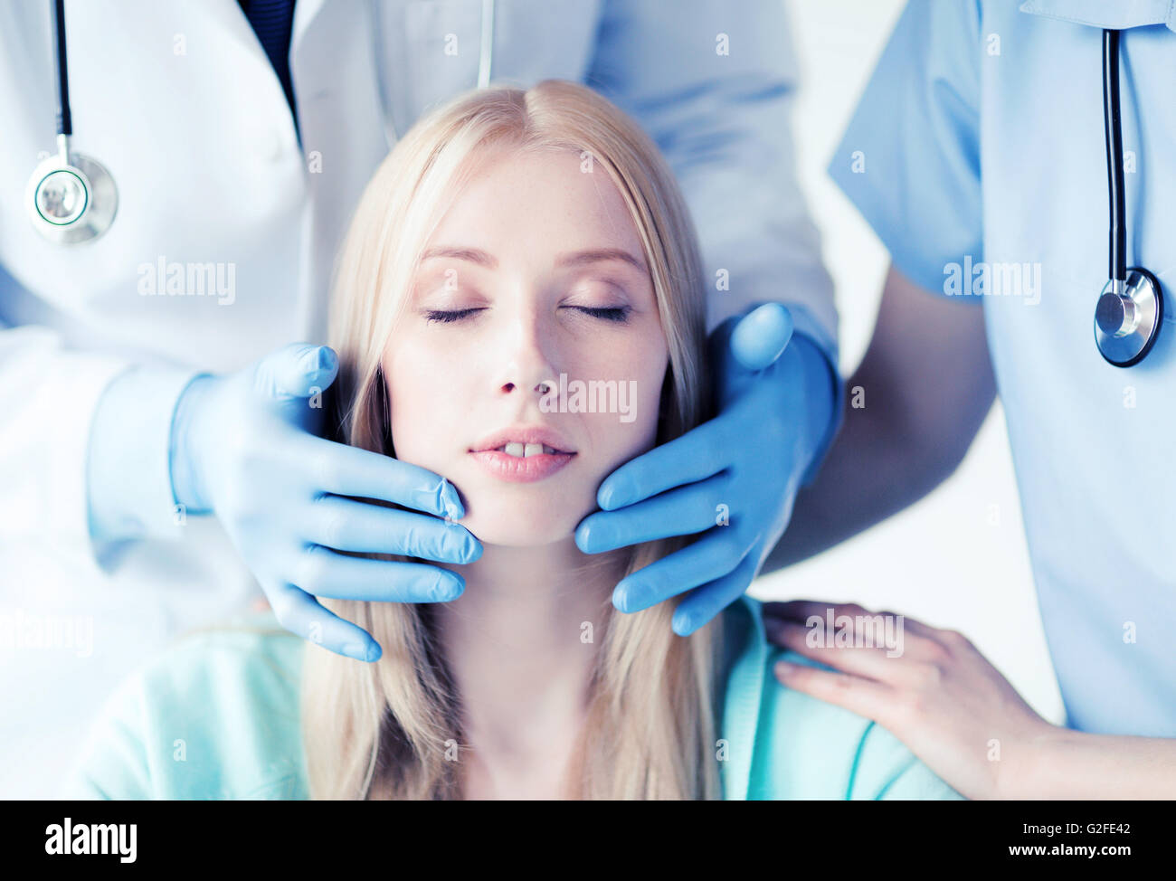 Plastic surgeon doctor patient hi-res stock photography and images - Alamy