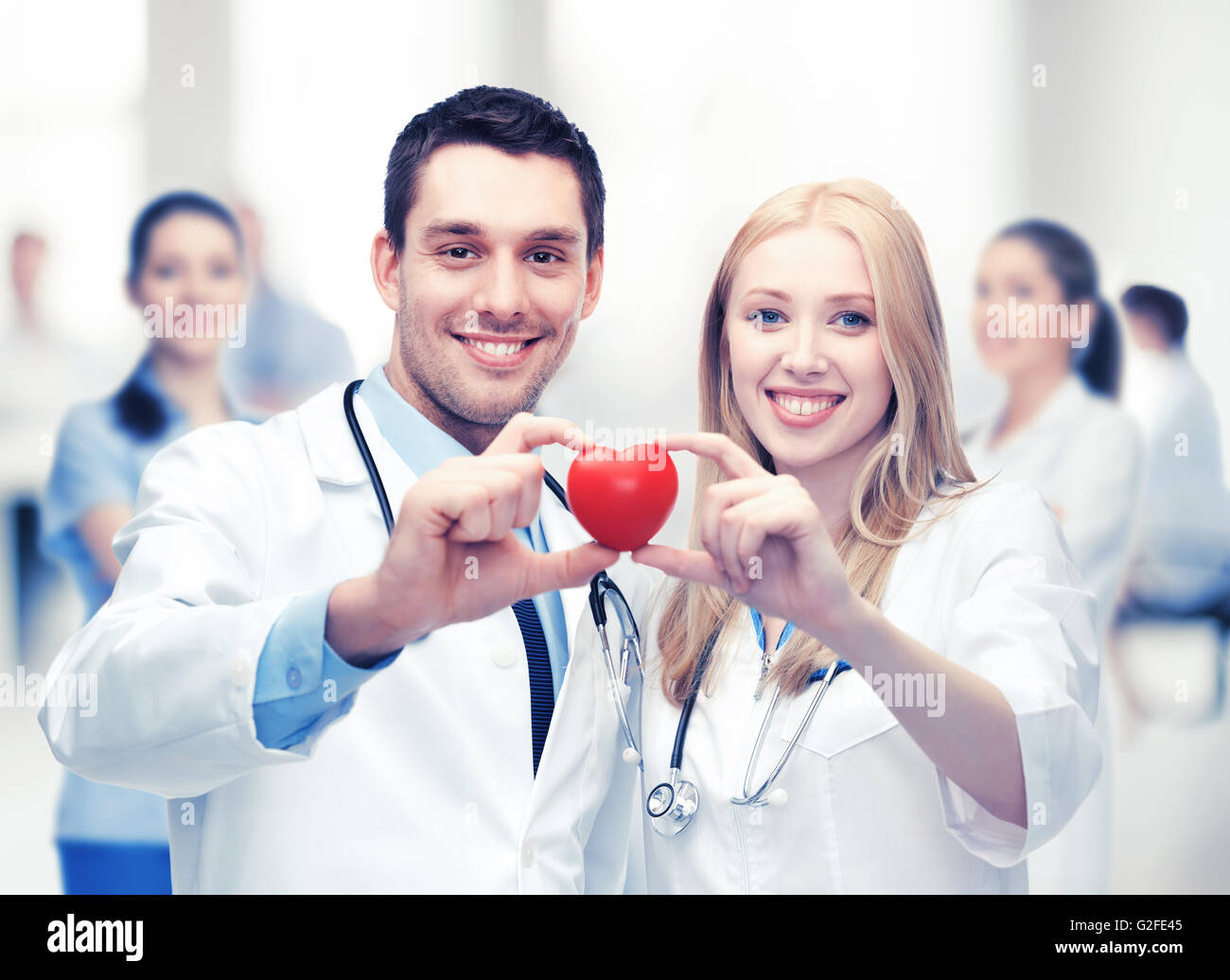 cardiologists with heart Stock Photo - Alamy