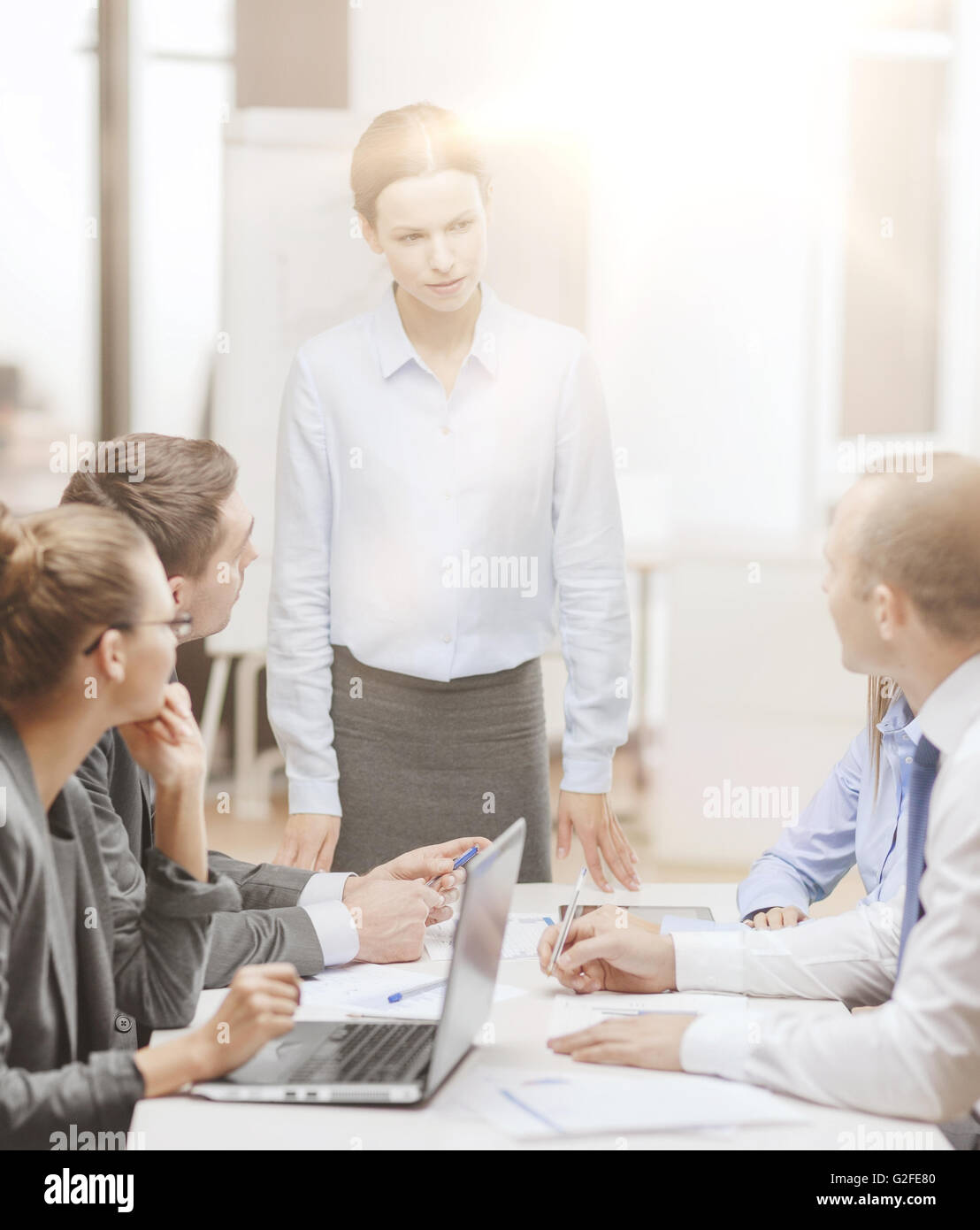strict female boss talking to business team Stock Photo - Alamy