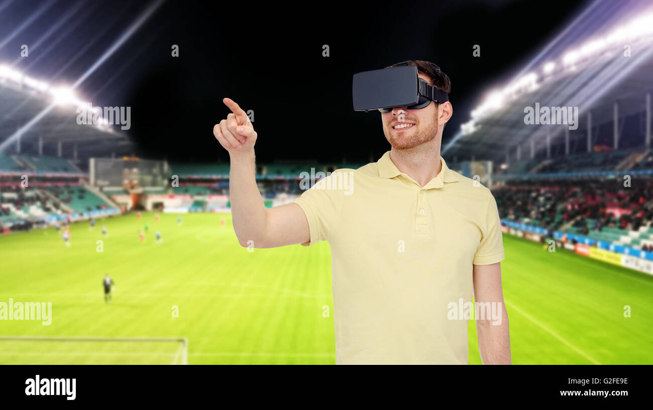 man in virtual reality headset over football field Stock Photo - Alamy