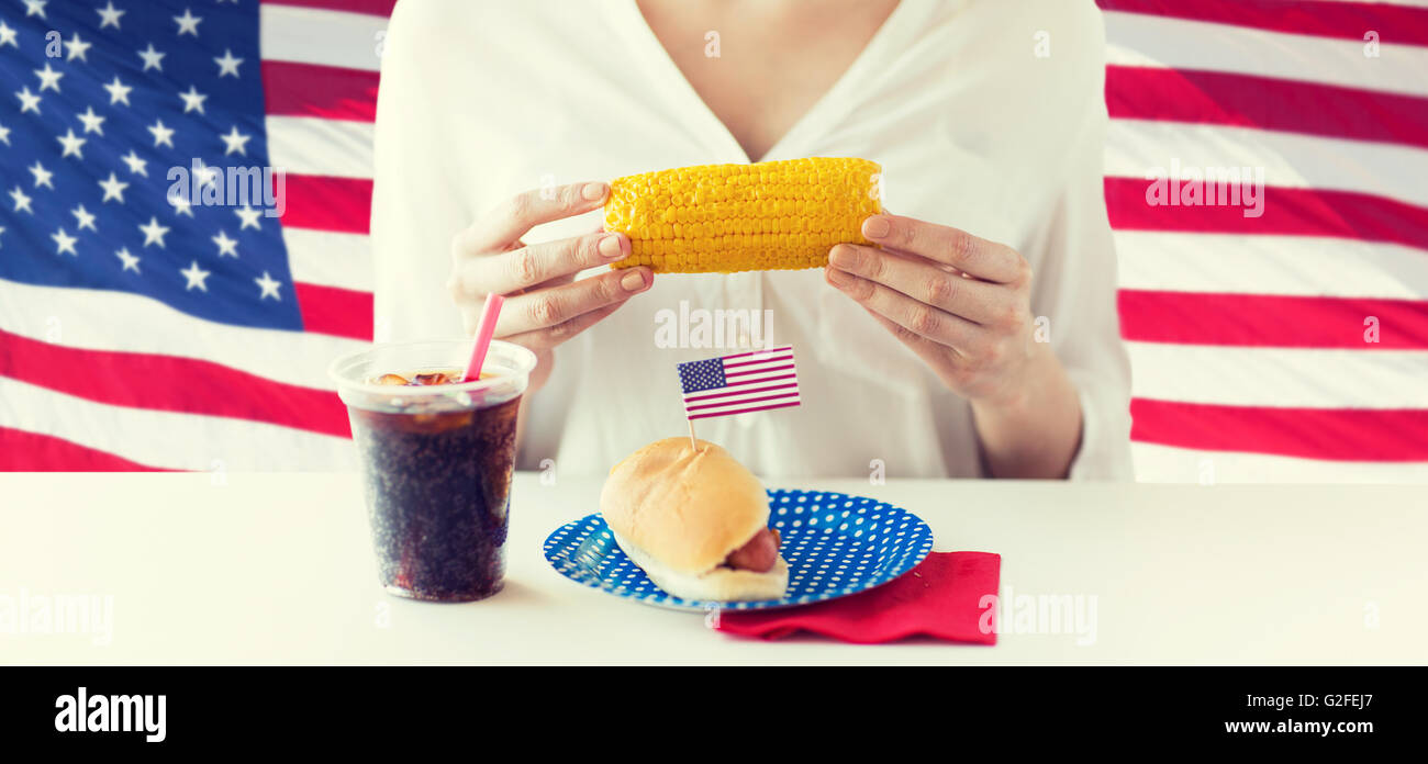 Woman eating corn dog hi-res stock photography and images - Alamy