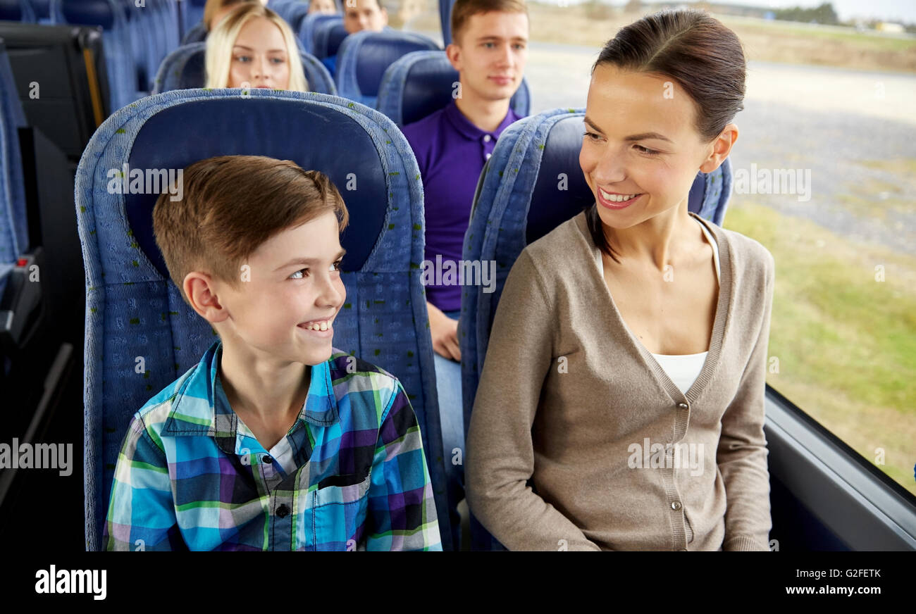 happy family riding in travel bus Stock Photo - Alamy