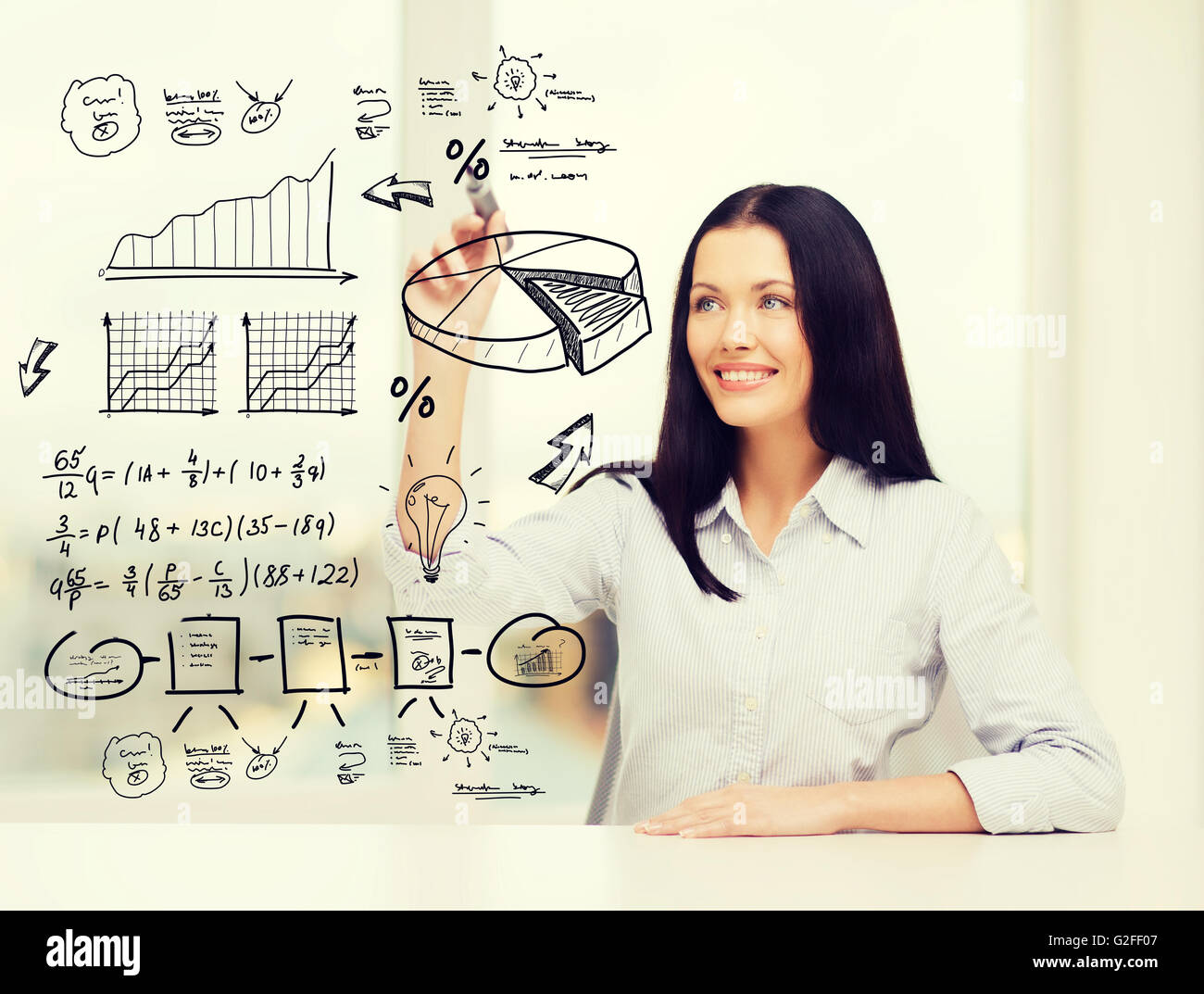 smiling woman drawing plan on virtual screen Stock Photo - Alamy