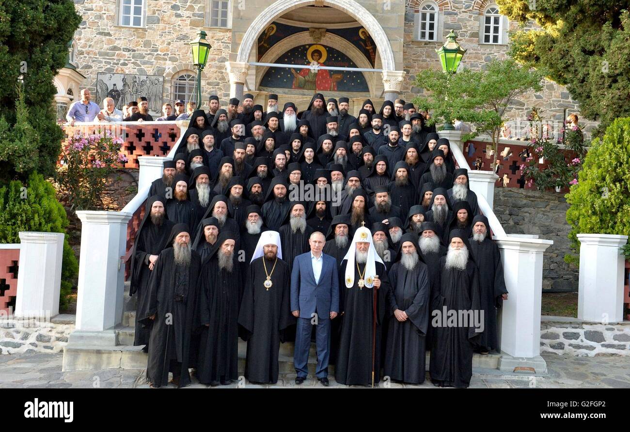 Russian President Vladimir Putin poses for a group photo with Russian ...