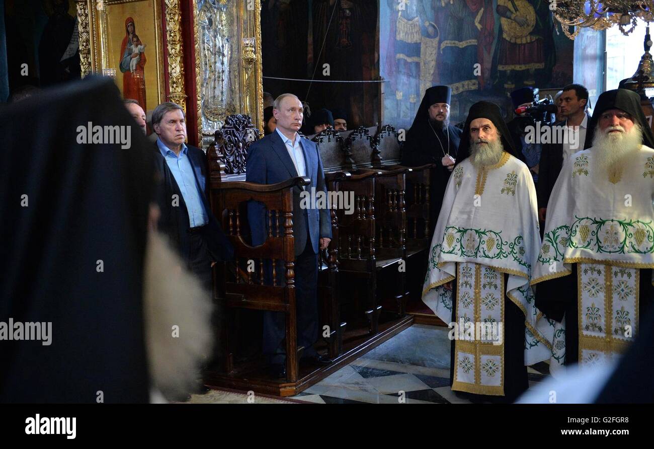 Russian President Vladimir Putin at a religious service at the Russian ...