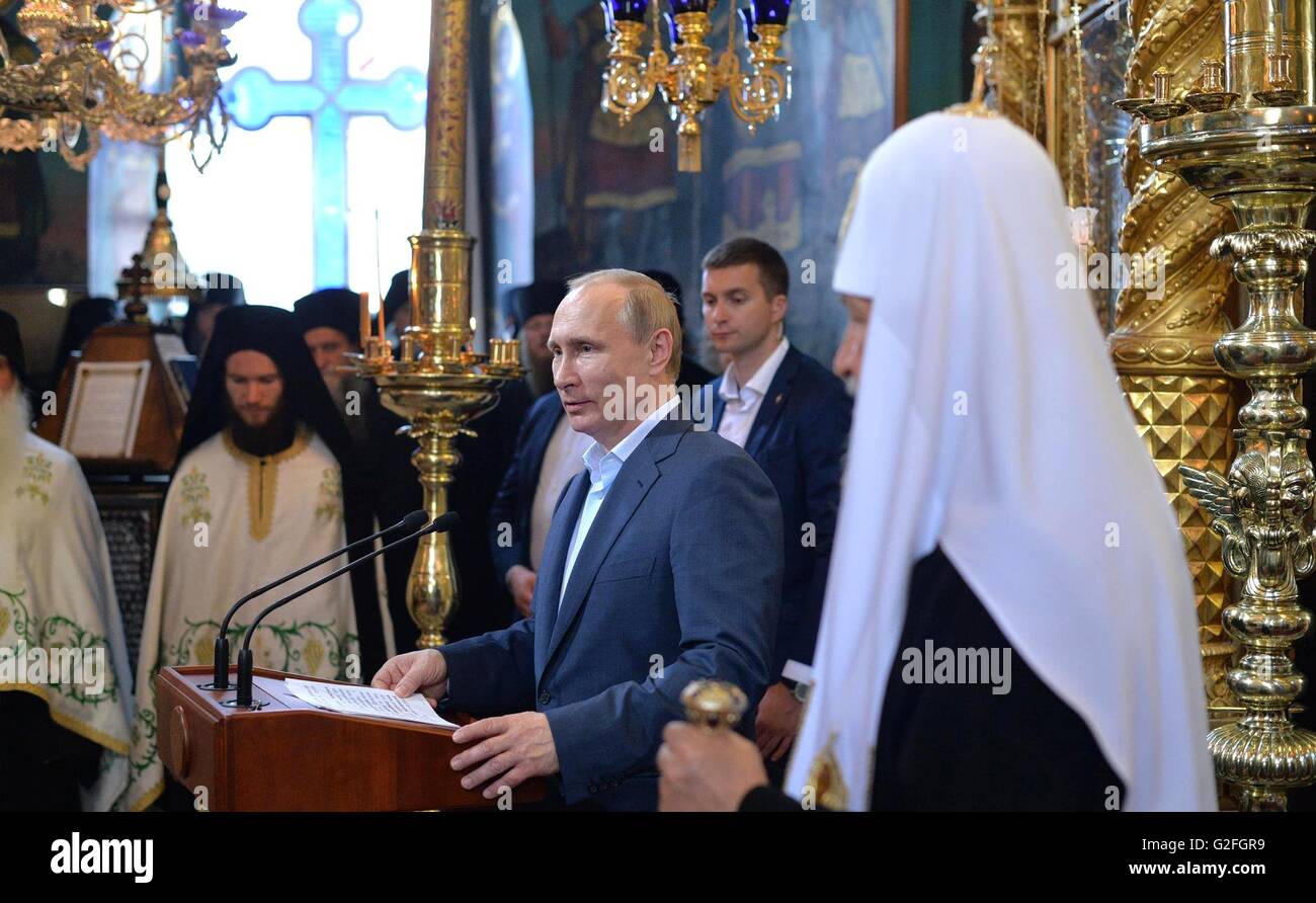 Russian President Vladimir Putin joins Russian Orthodox Patriarch ...