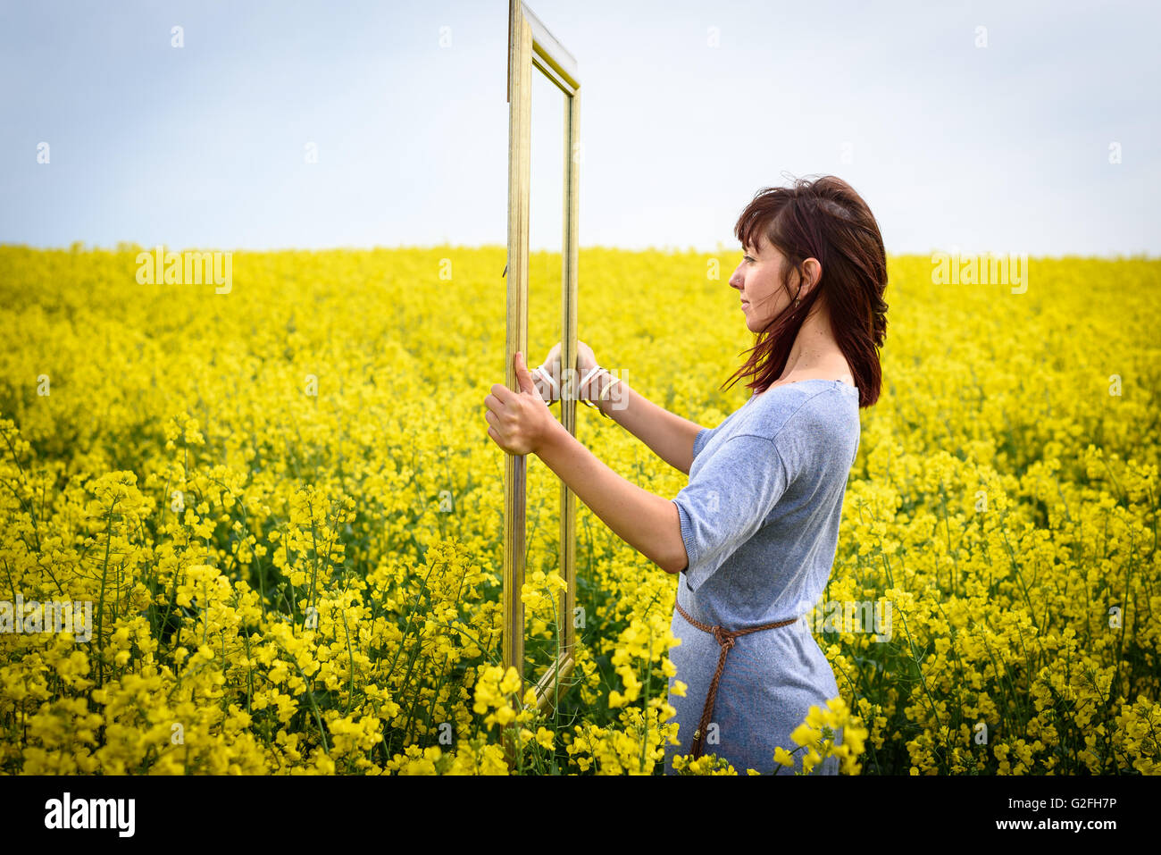 Looking at reflection in mirror Stock Photo - Alamy