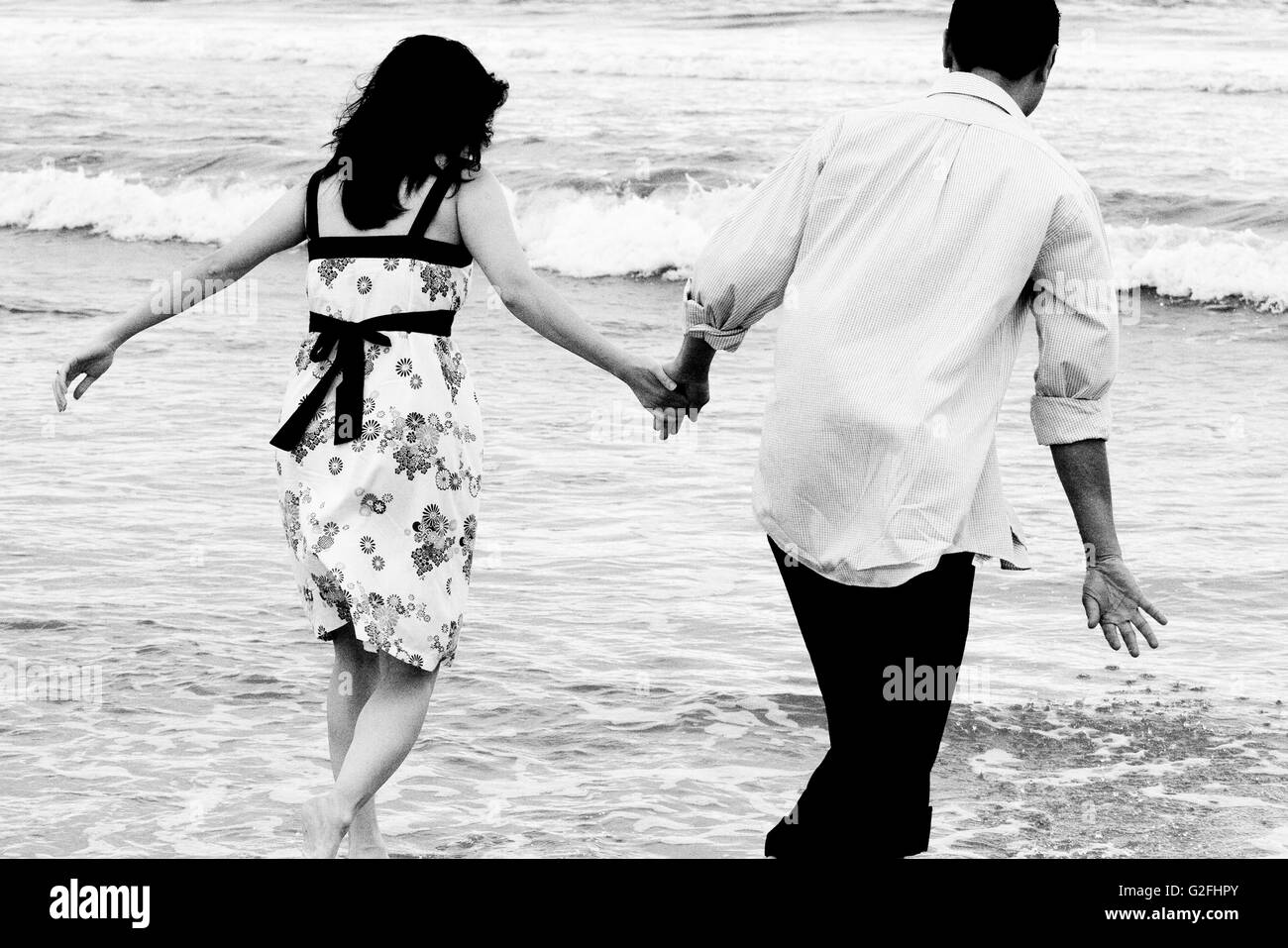 Two hands woman holding Black and White Stock Photos & Images - Alamy